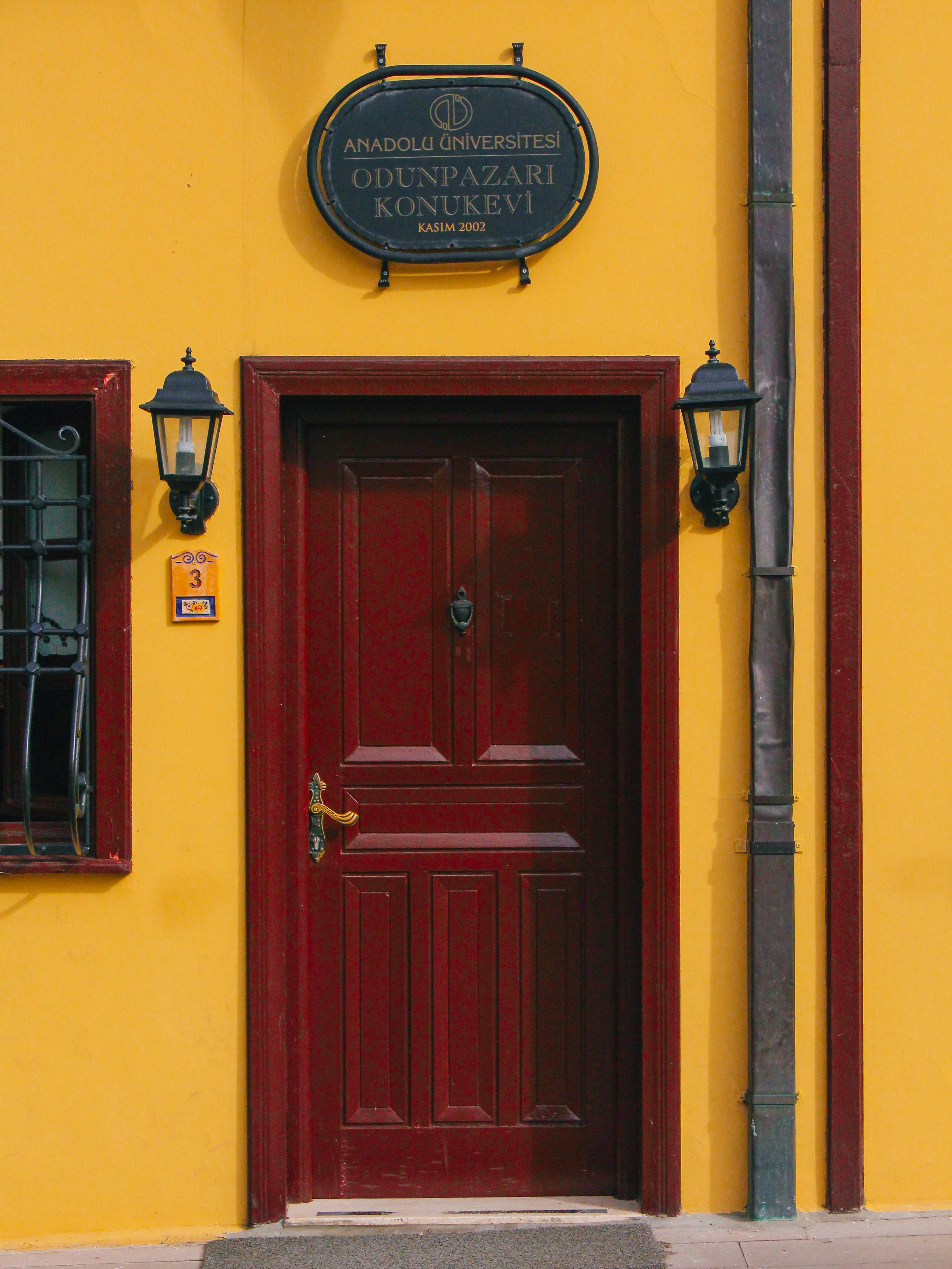 Wooden Door in a Building · Free Stock Photo