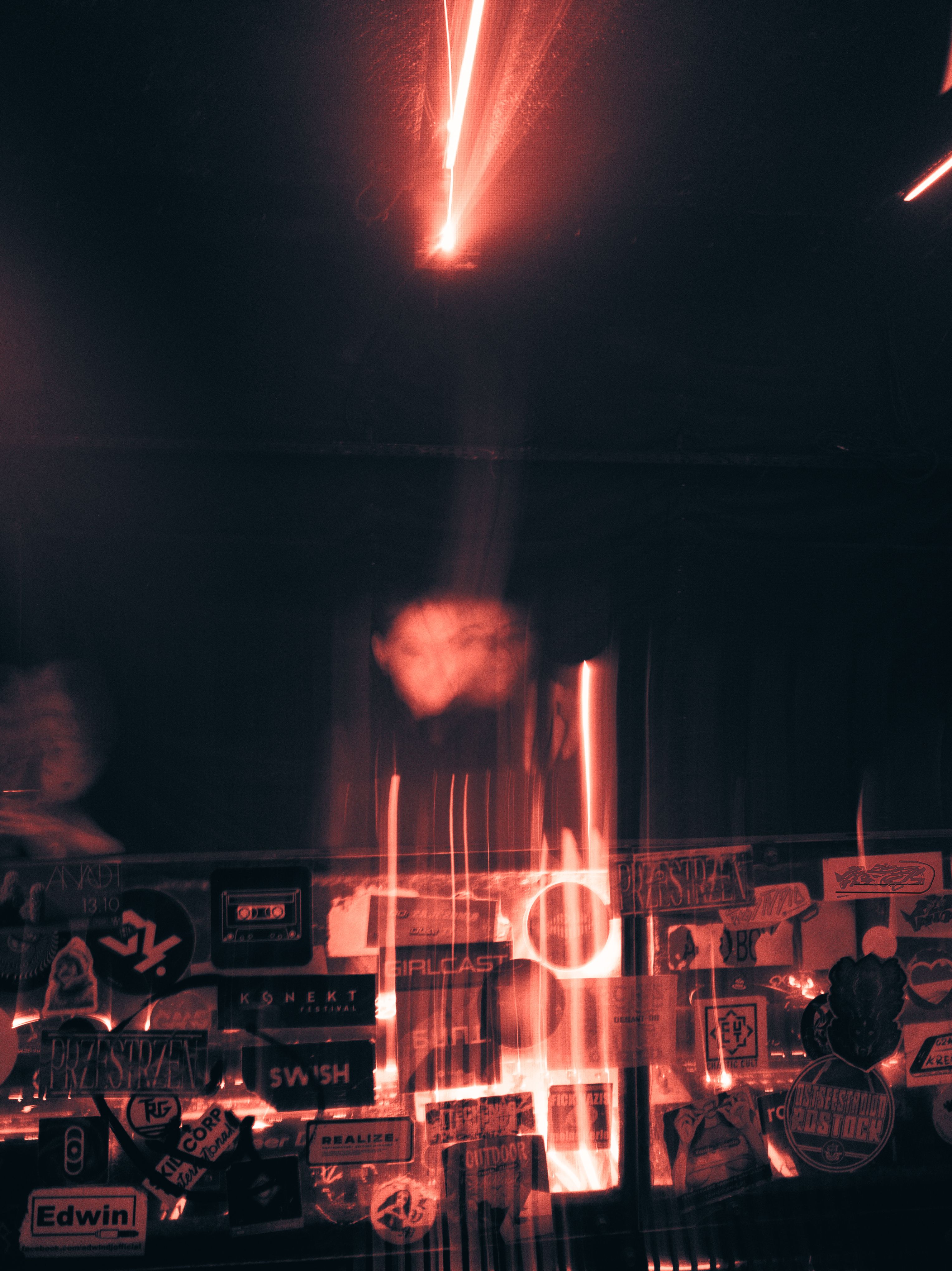 Blurred Lights around Wall in Darkness · Free Stock Photo
