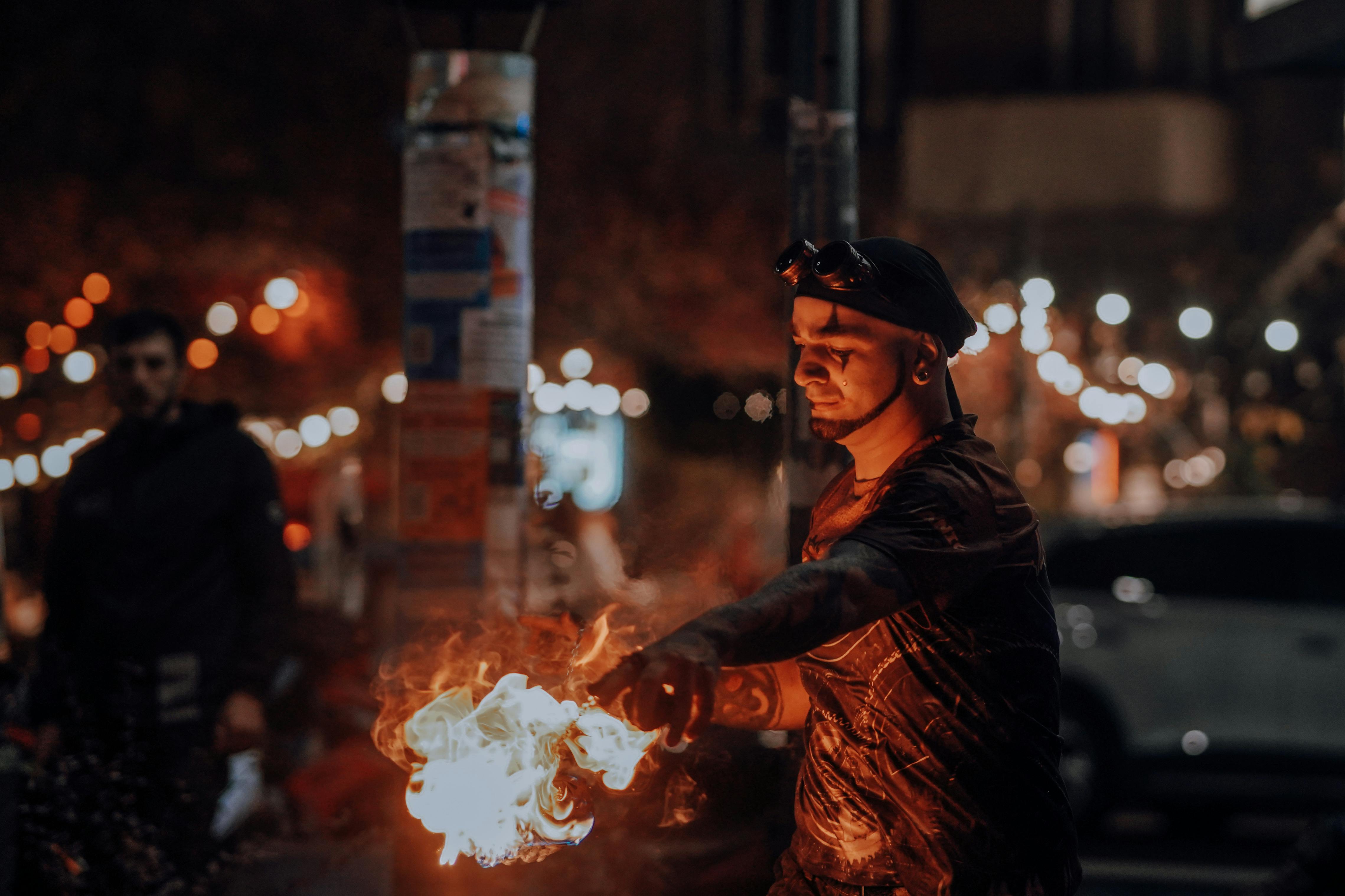 Man Spitting Fire at Night · Free Stock Photo