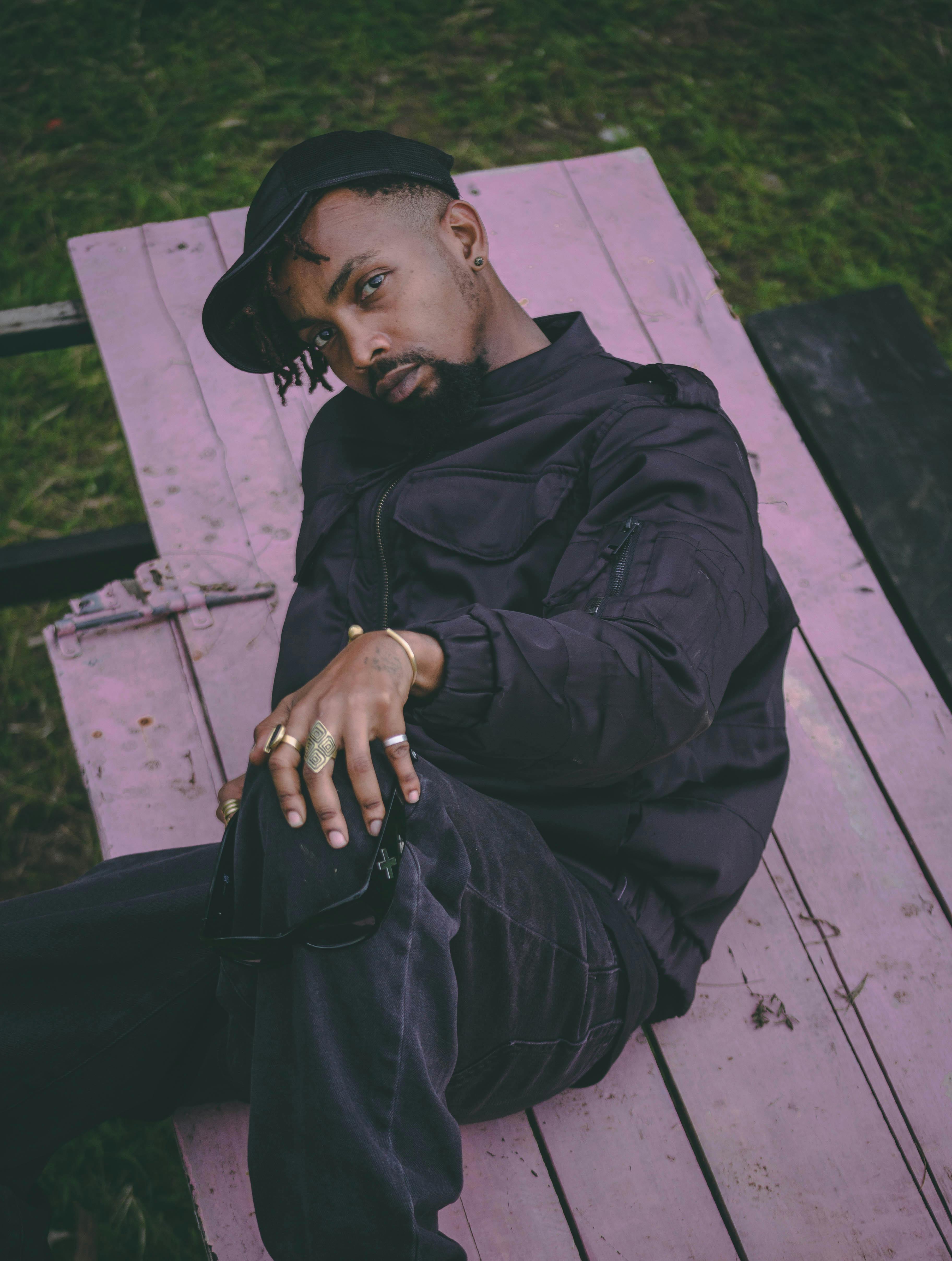 Young Man in a Casual Outfit Standing Outside · Free Stock Photo