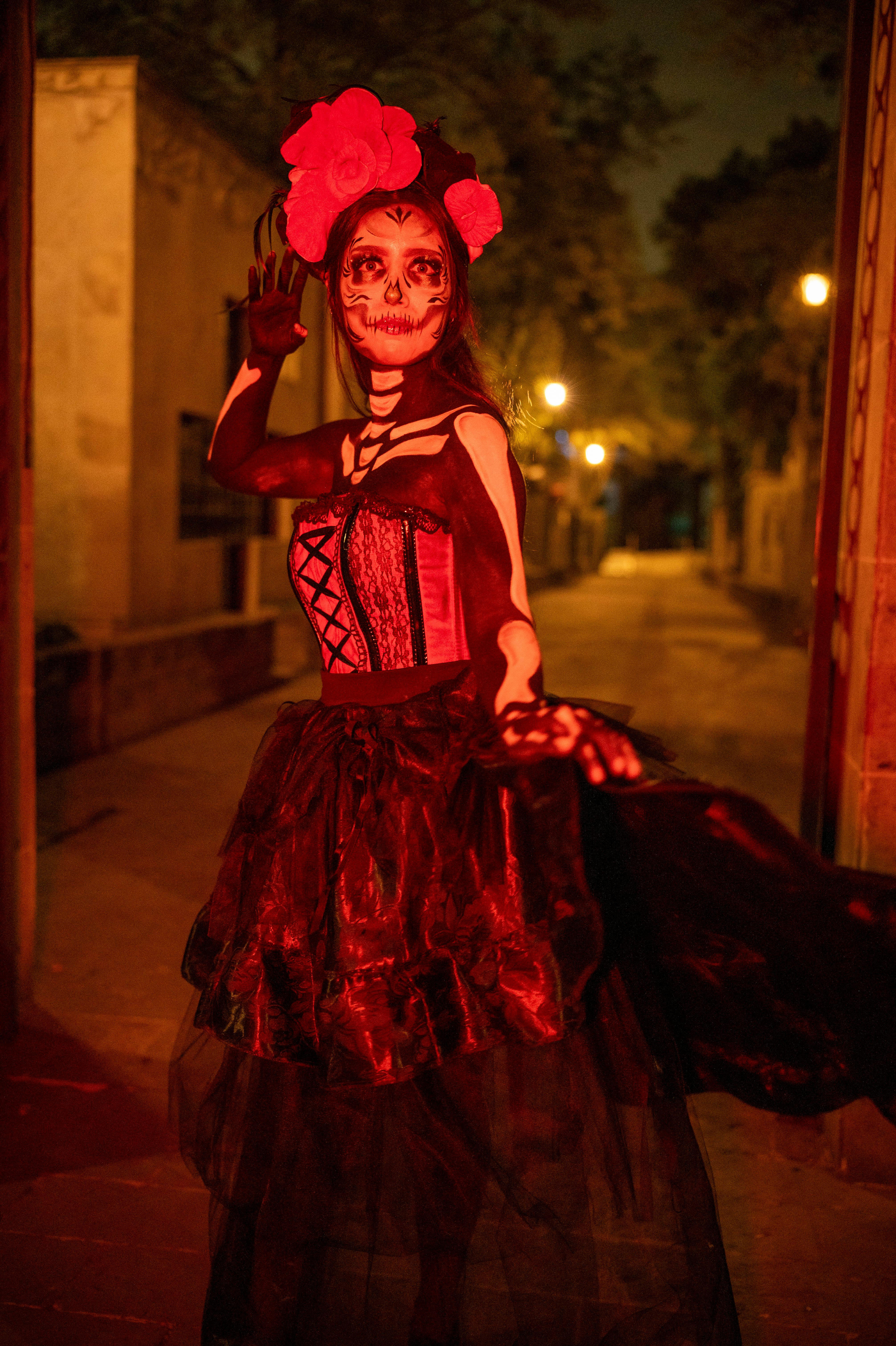 Catrina Standing at Night · Free Stock Photo