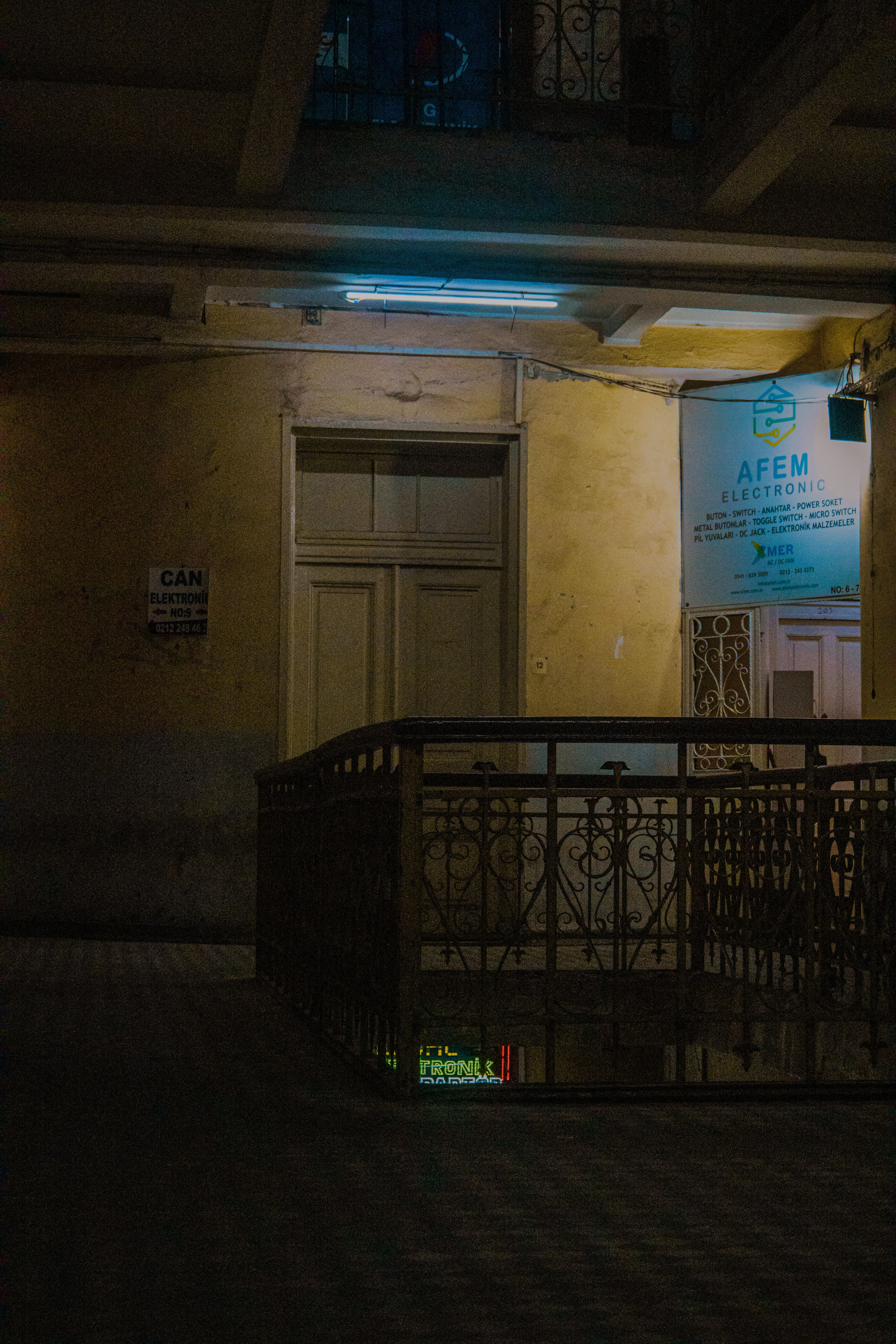 Dimly Lit Corridor of an Old Neglected Building · Free Stock Photo