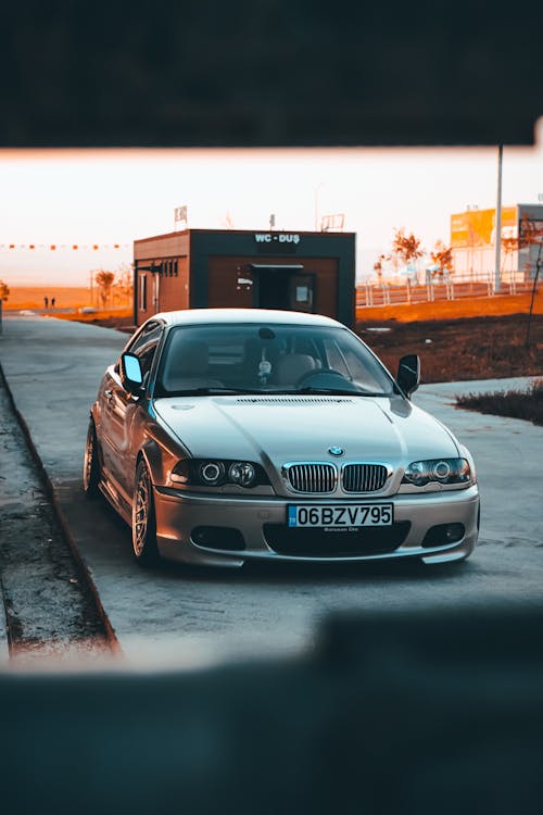 Silver Car Parked on Asphalt · Free Stock Photo Silver Car Parked on Asphalt · Free Stock Photo
