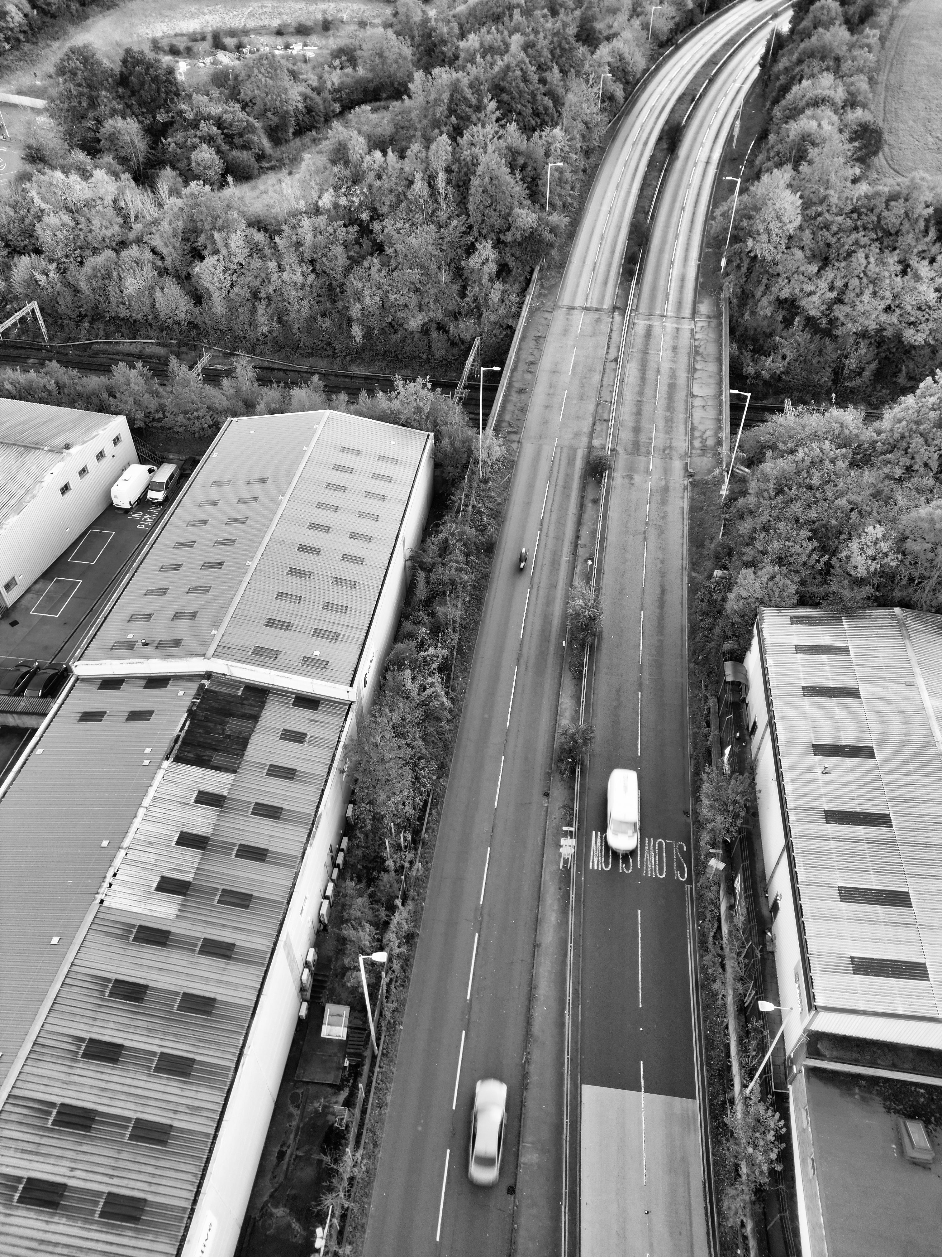 Roofs of Buildings around Road · Free Stock Photo