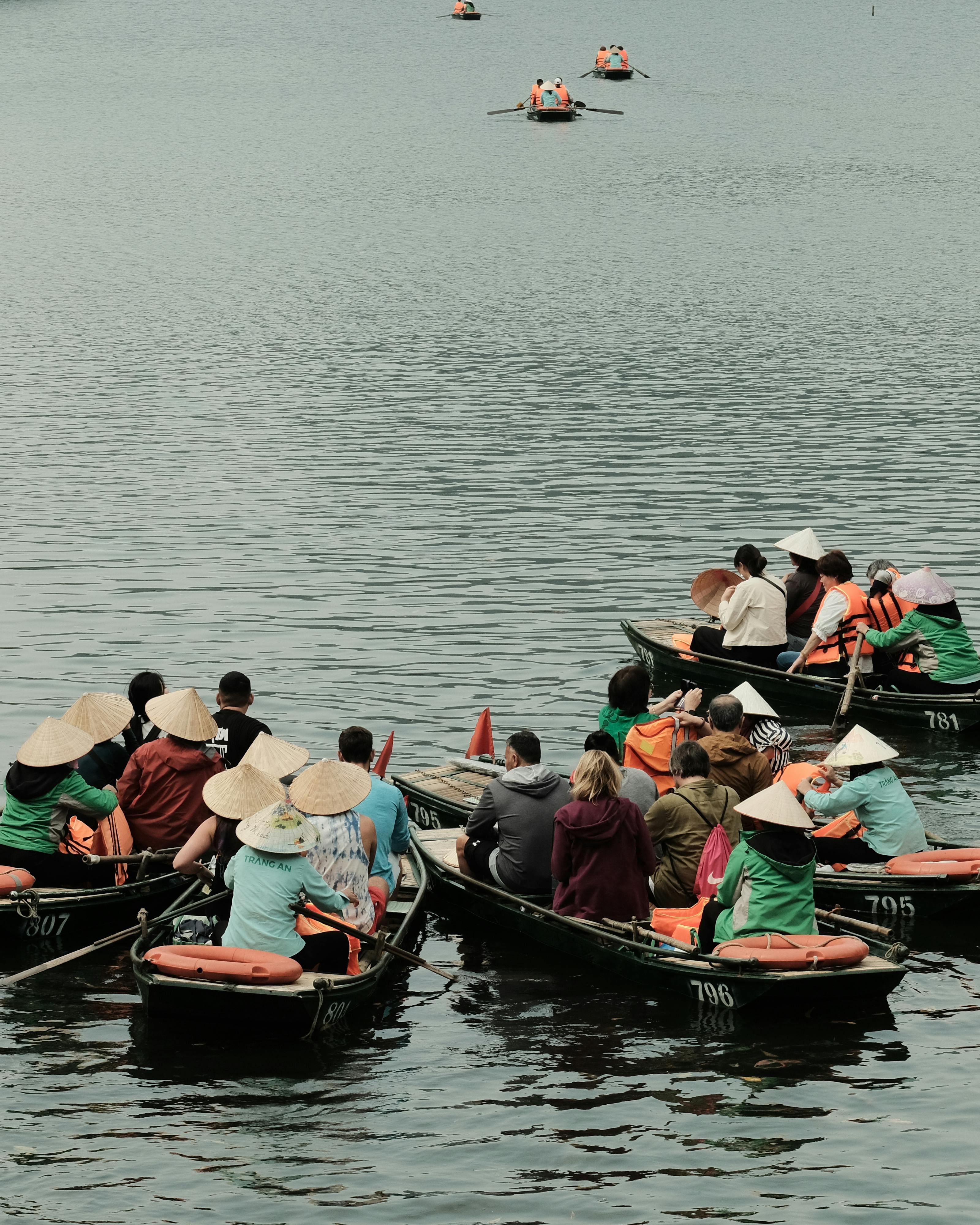 People Sitting on Boats · Free Stock Photo