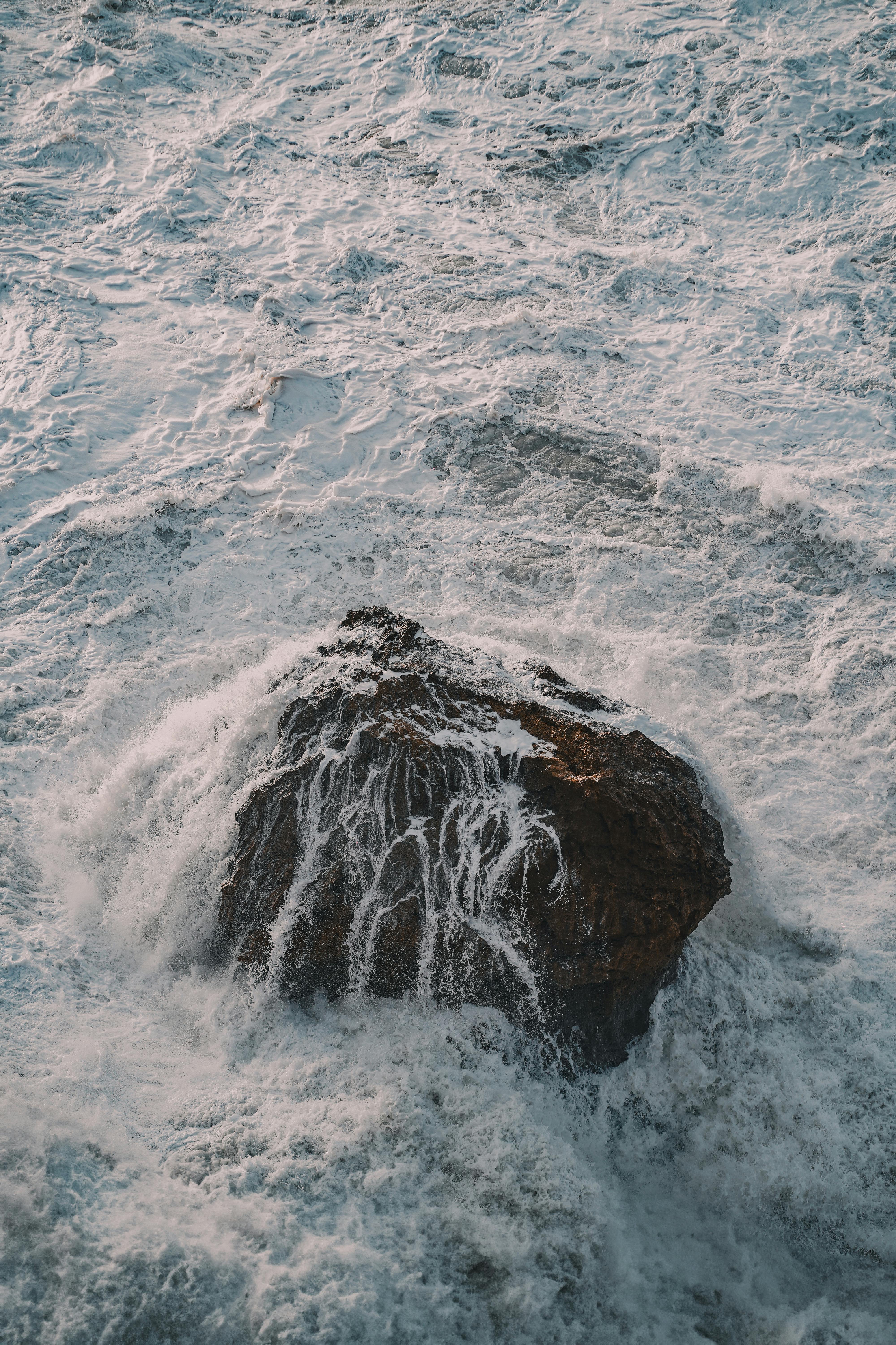 Rock in a Sea · Free Stock Photo