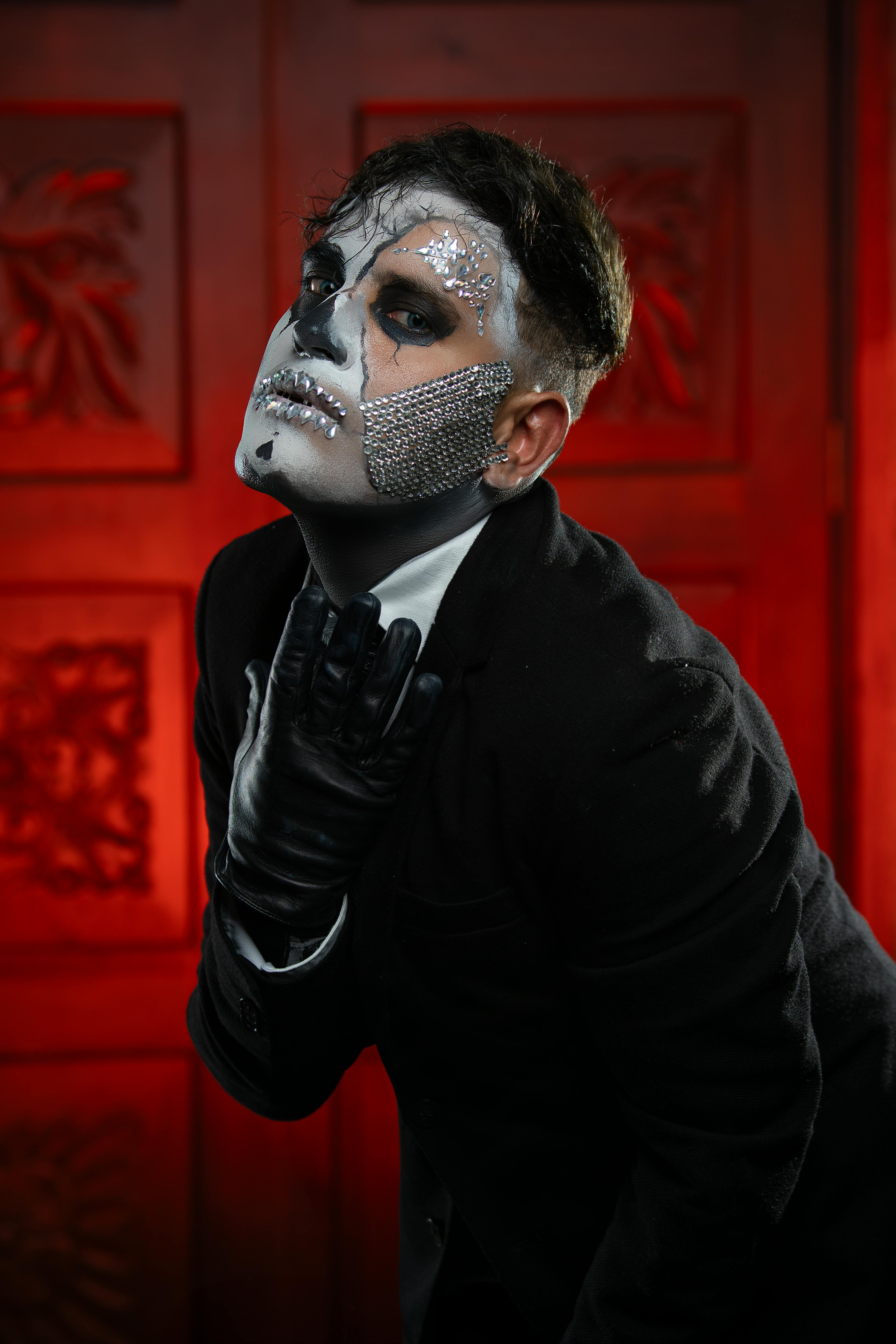 Man Wearing a Costume and Sugar Skull Makeup with Shiny Beads · Free ...