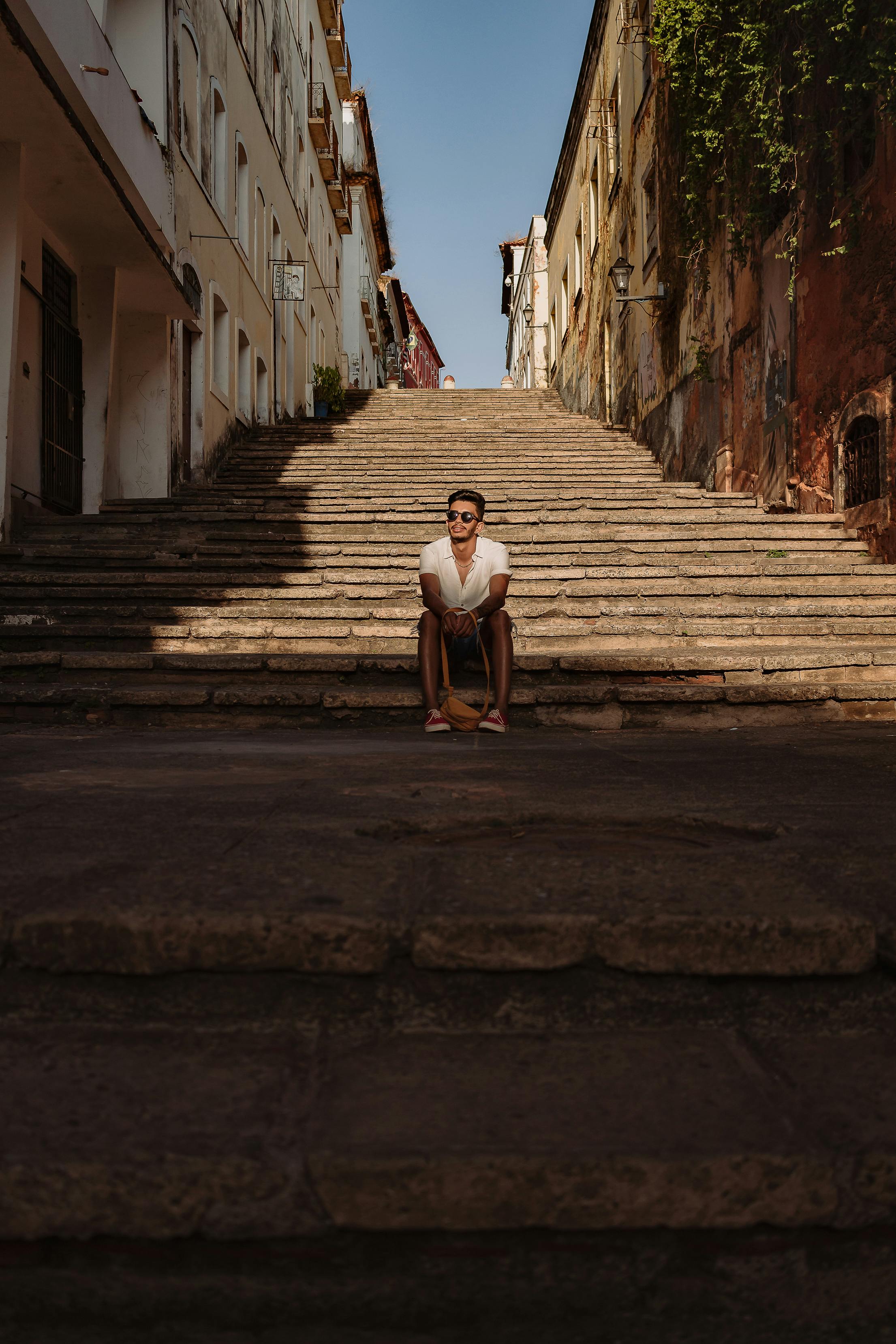 Man Walking Down Town Steps · Free Stock Photo