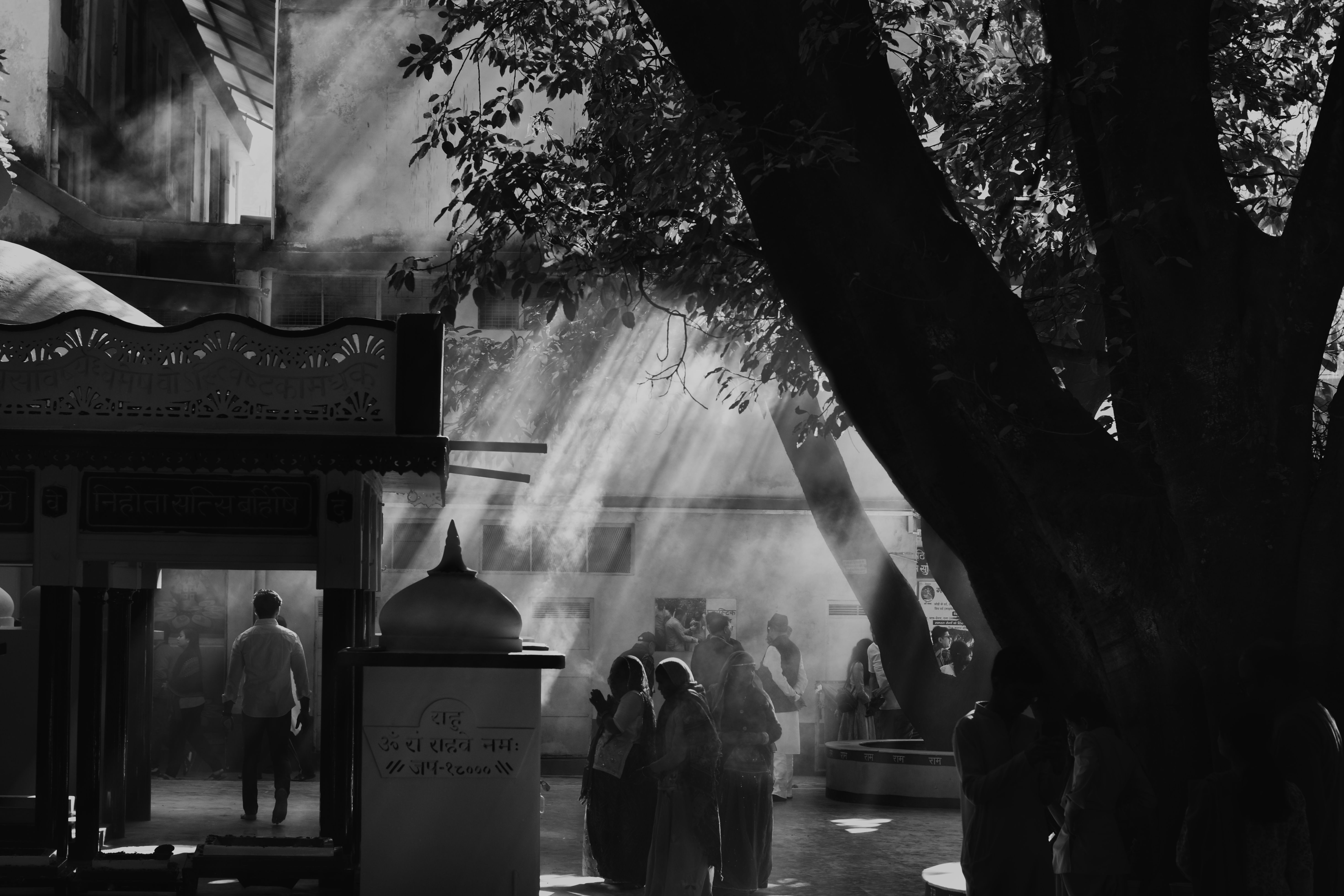 Sunlight Shining on People in Town Square · Free Stock Photo