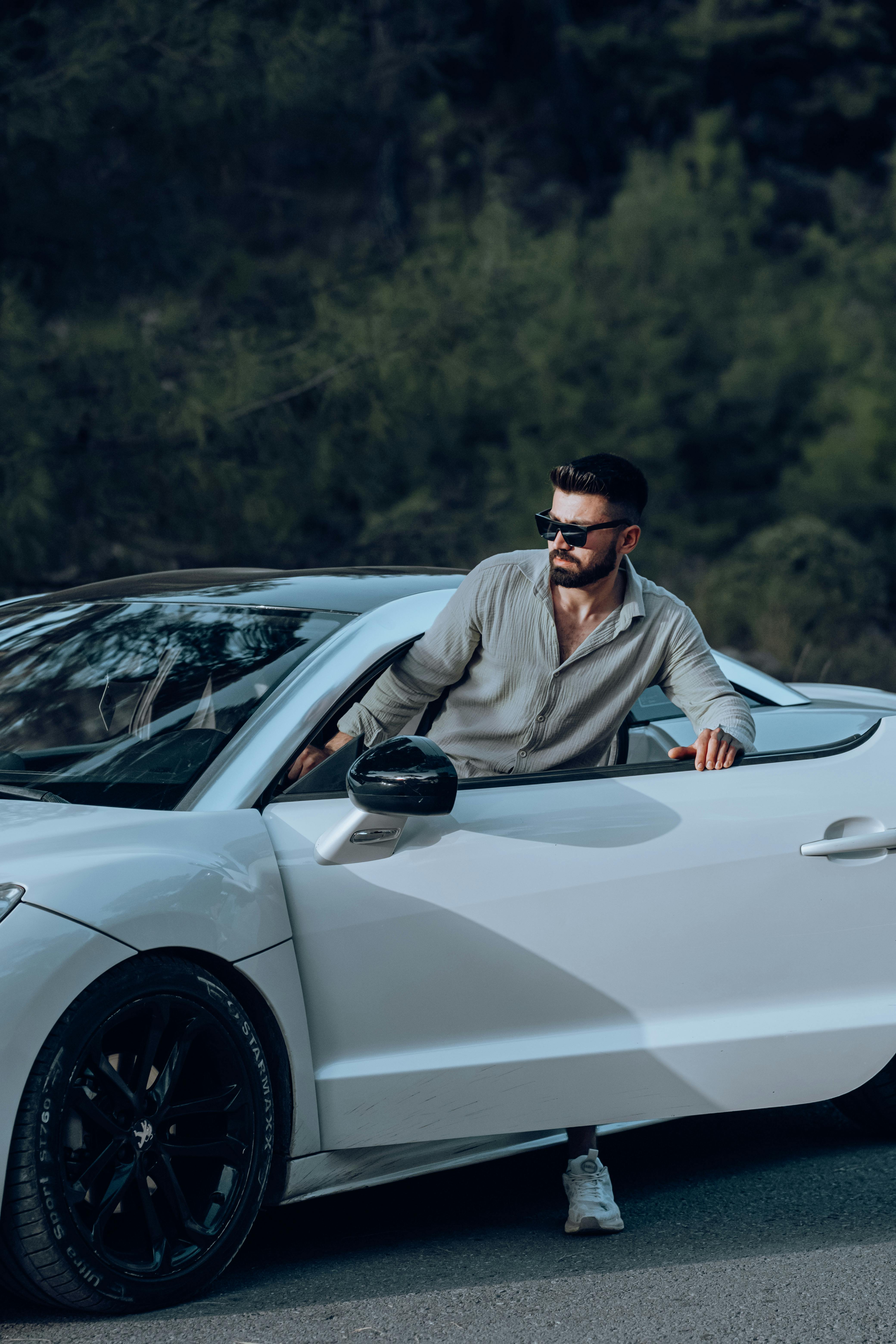 Man Entering White Luxury Car · Free Stock Photo