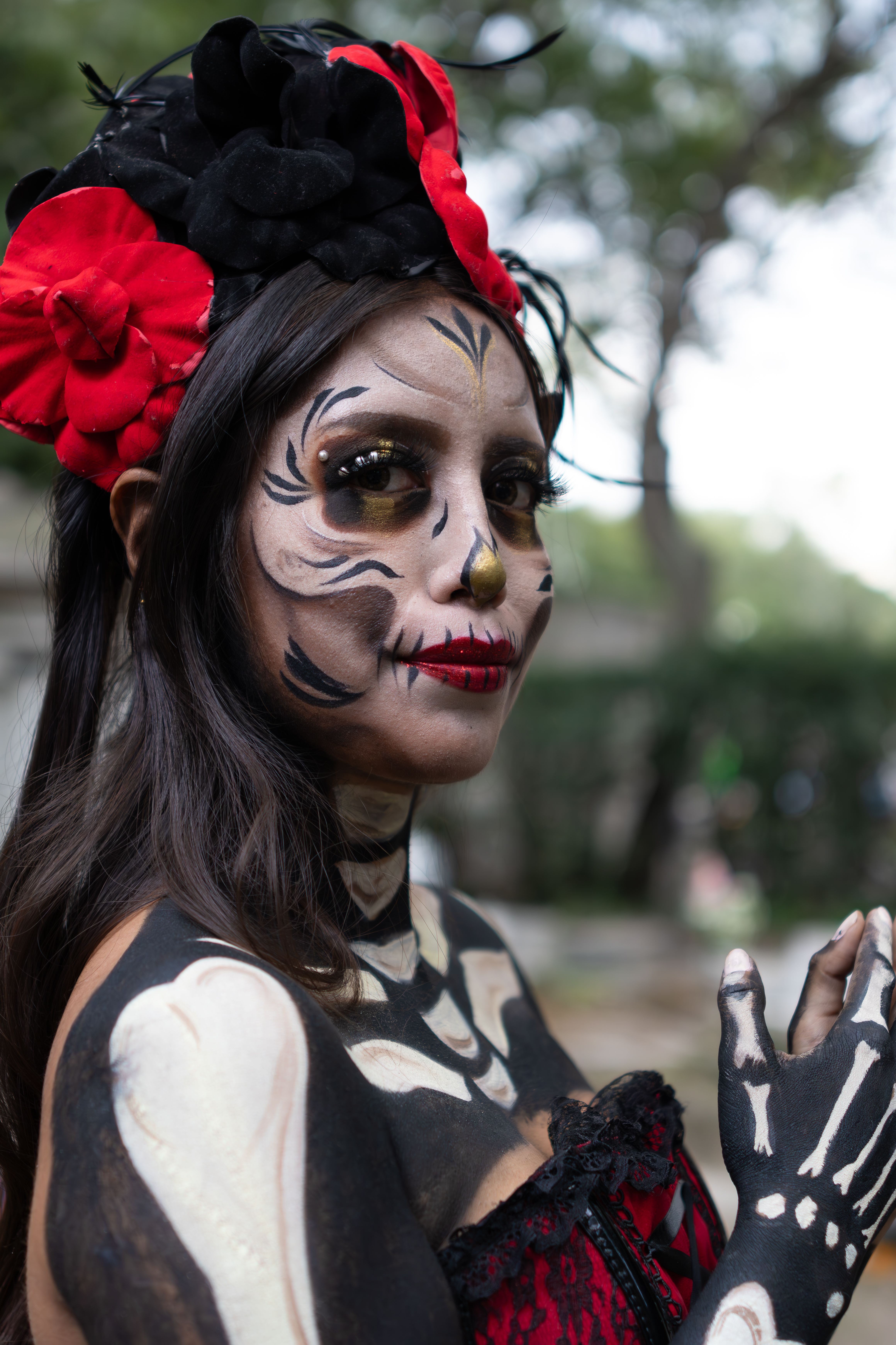Portrait of a Woman in Traditional Calavera Catrina Costume and Makeup ...