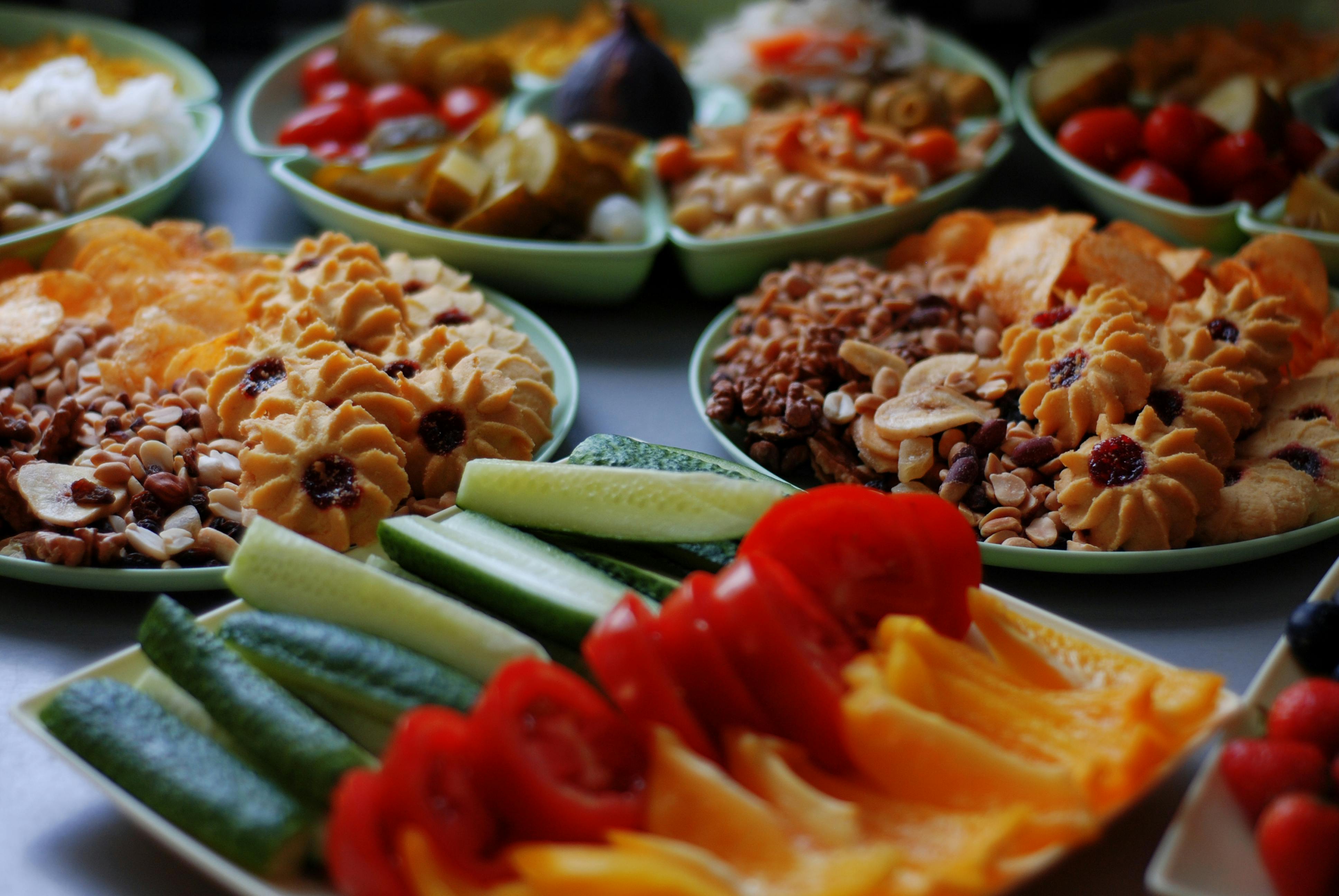 Closeup of a Table with a Variety of Biscuits and Vegetables · Free ...
