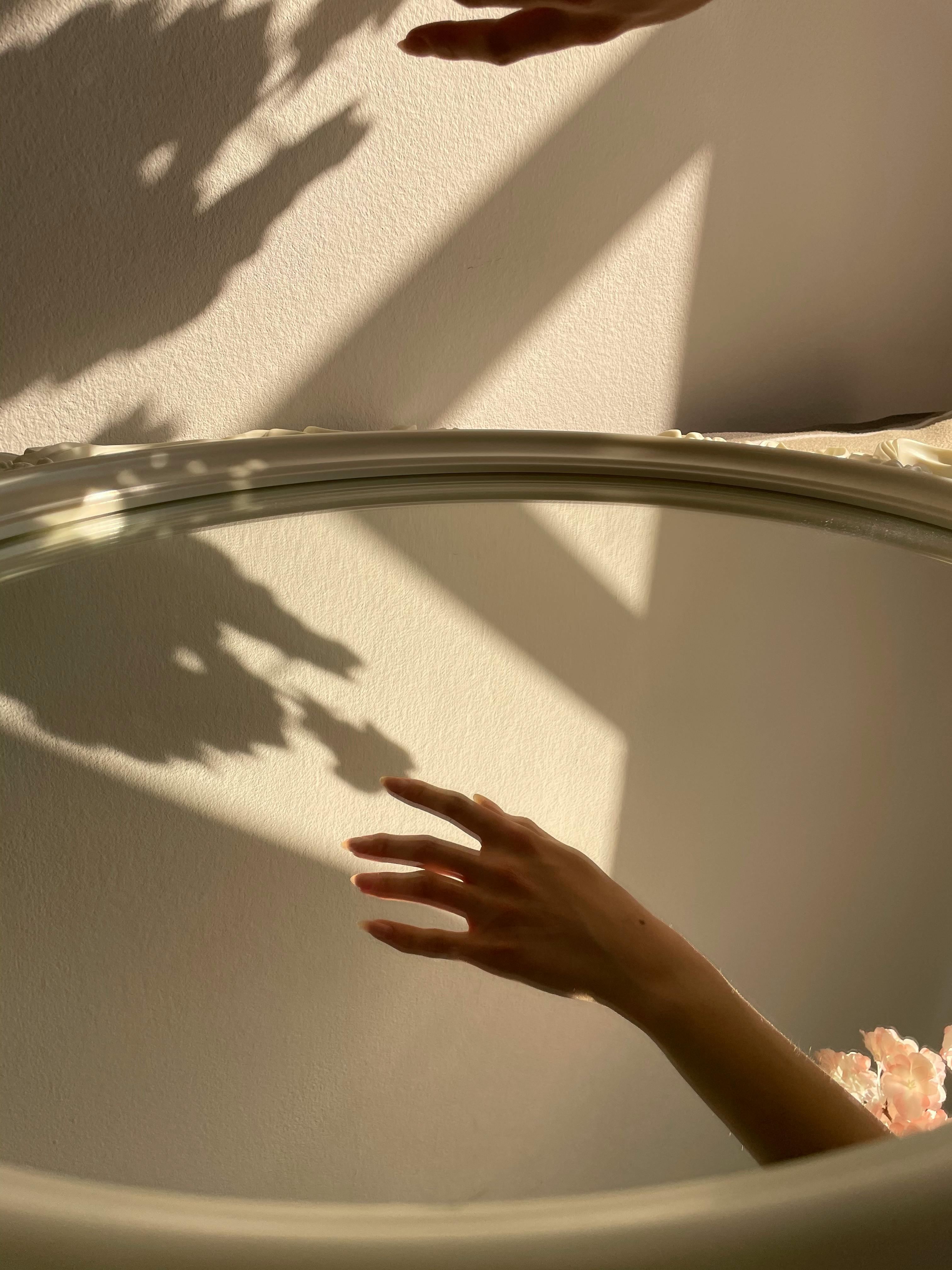 Woman Hand Reflection in Mirror · Free Stock Photo