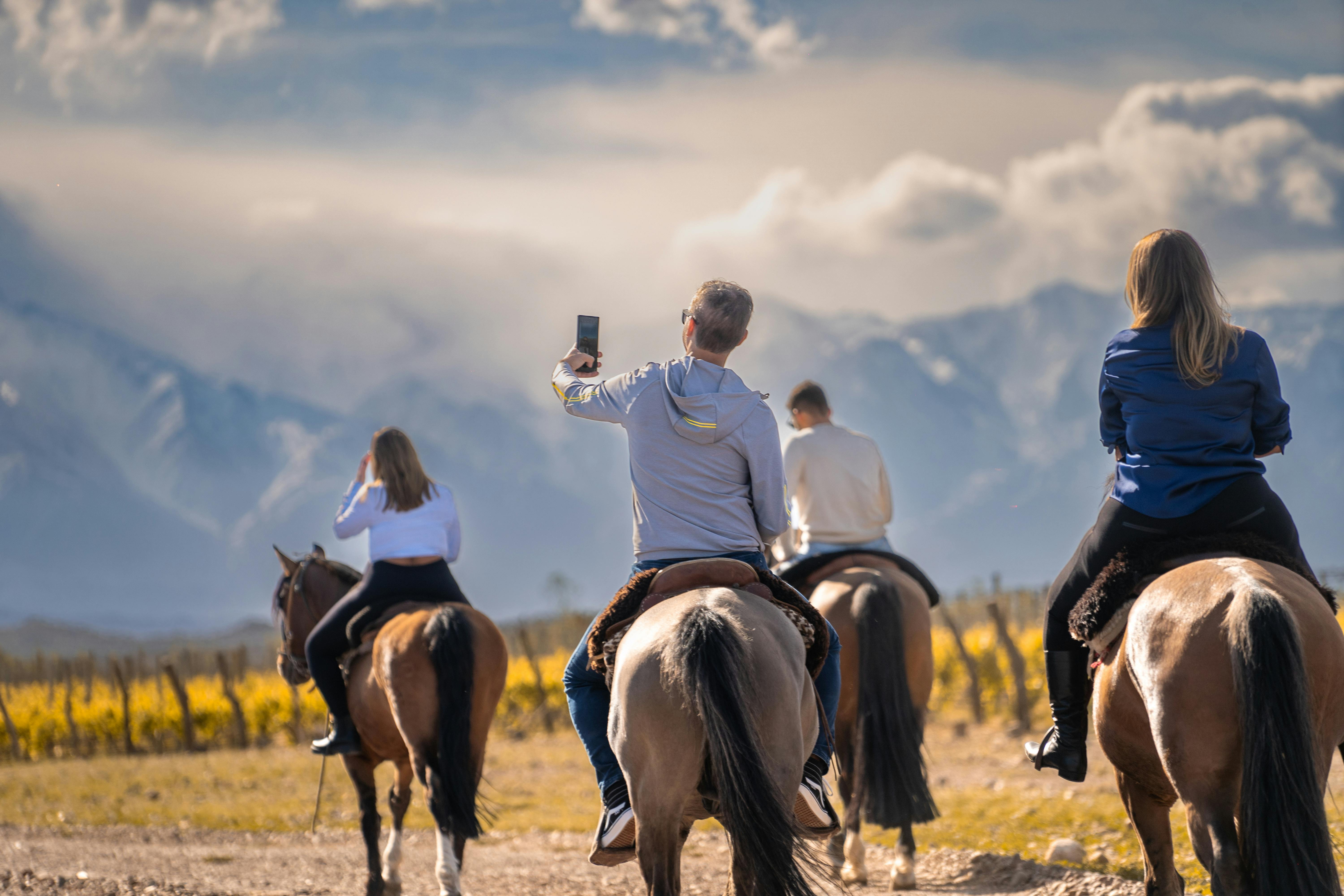 People Horseback Riding in Desert · Free Stock Photo