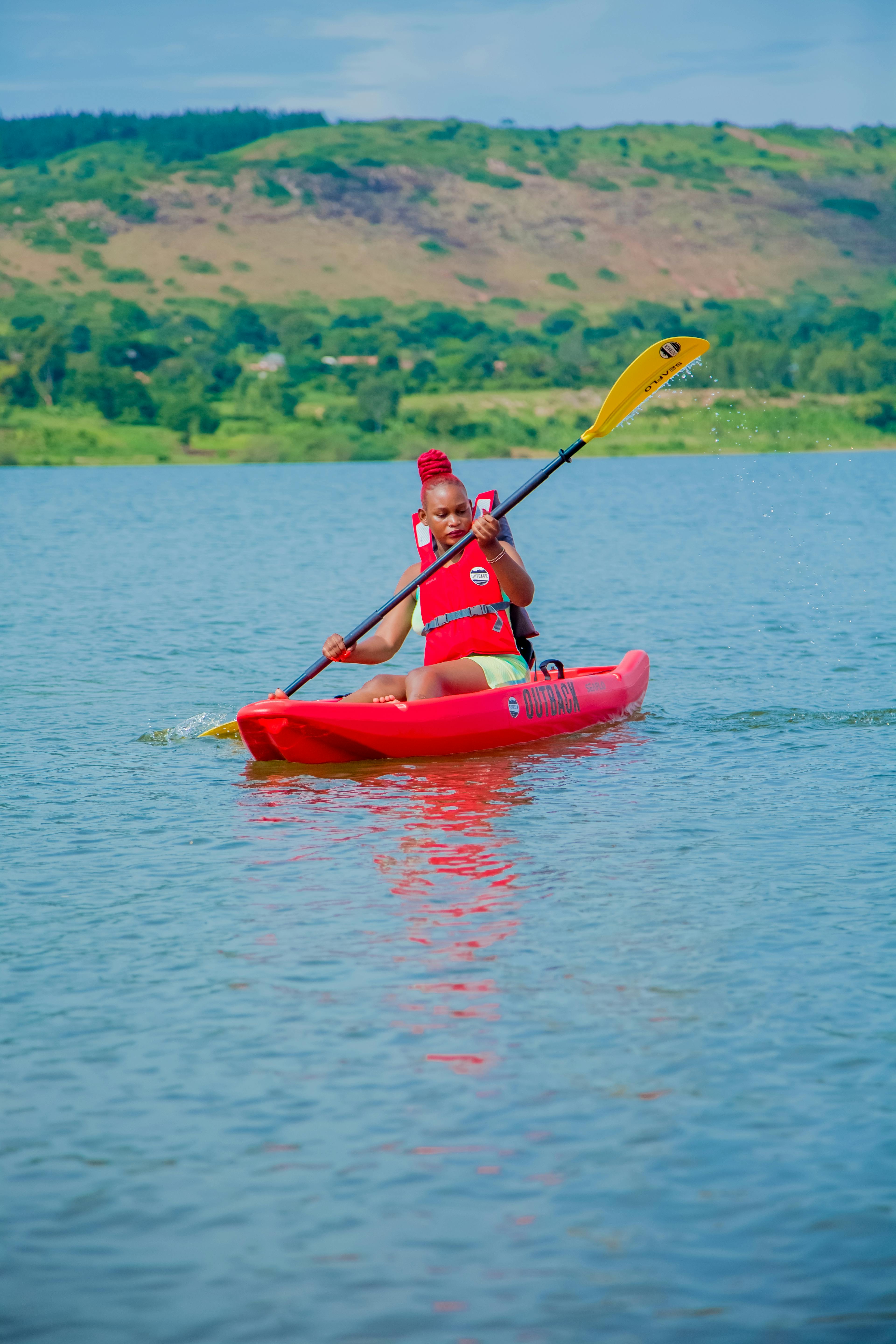 Man Swimming on Kayak in a River · Free Stock Photo