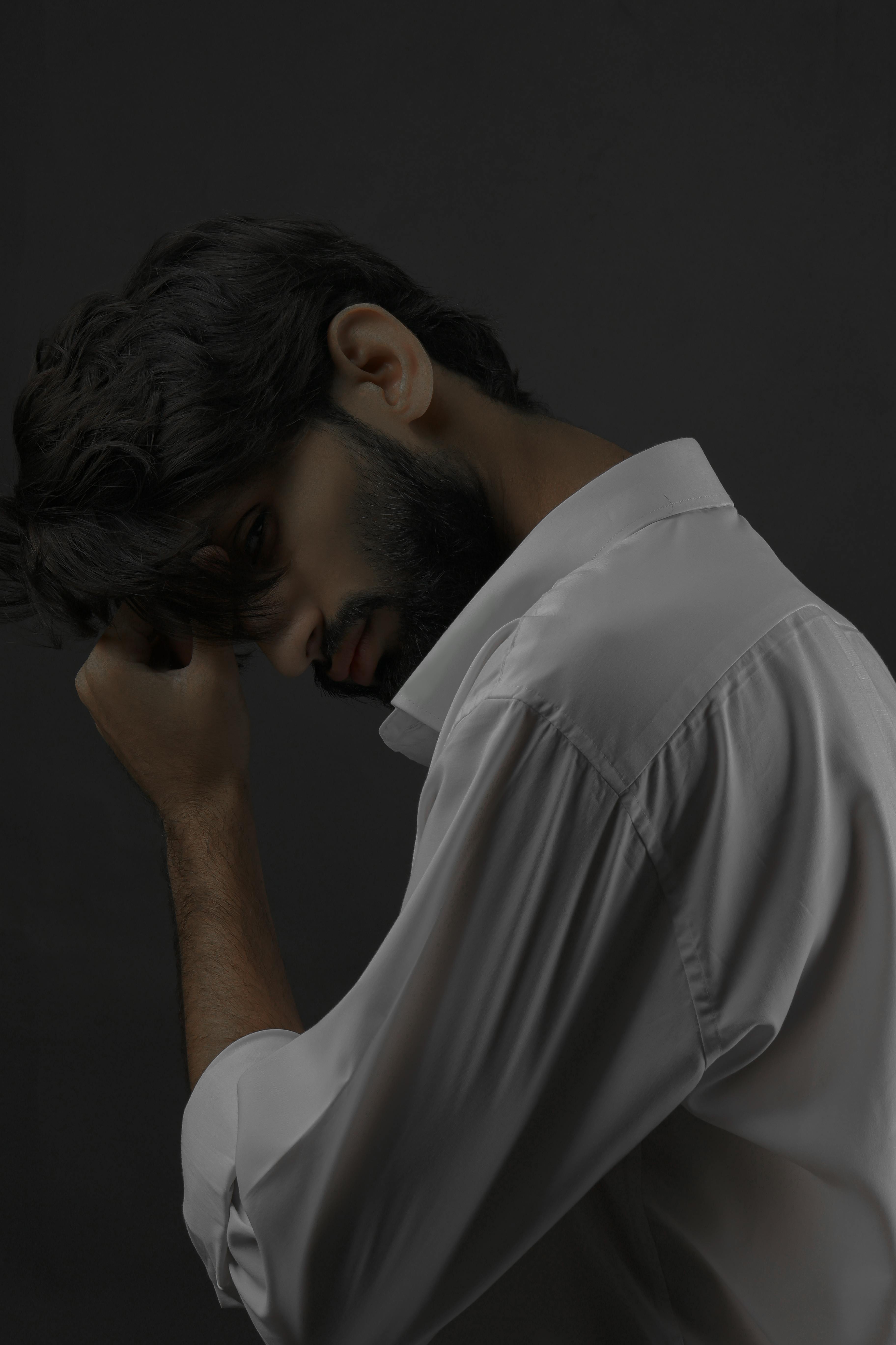 Portrait of Man Wearing White Shirt in a Shadow · Free Stock Photo