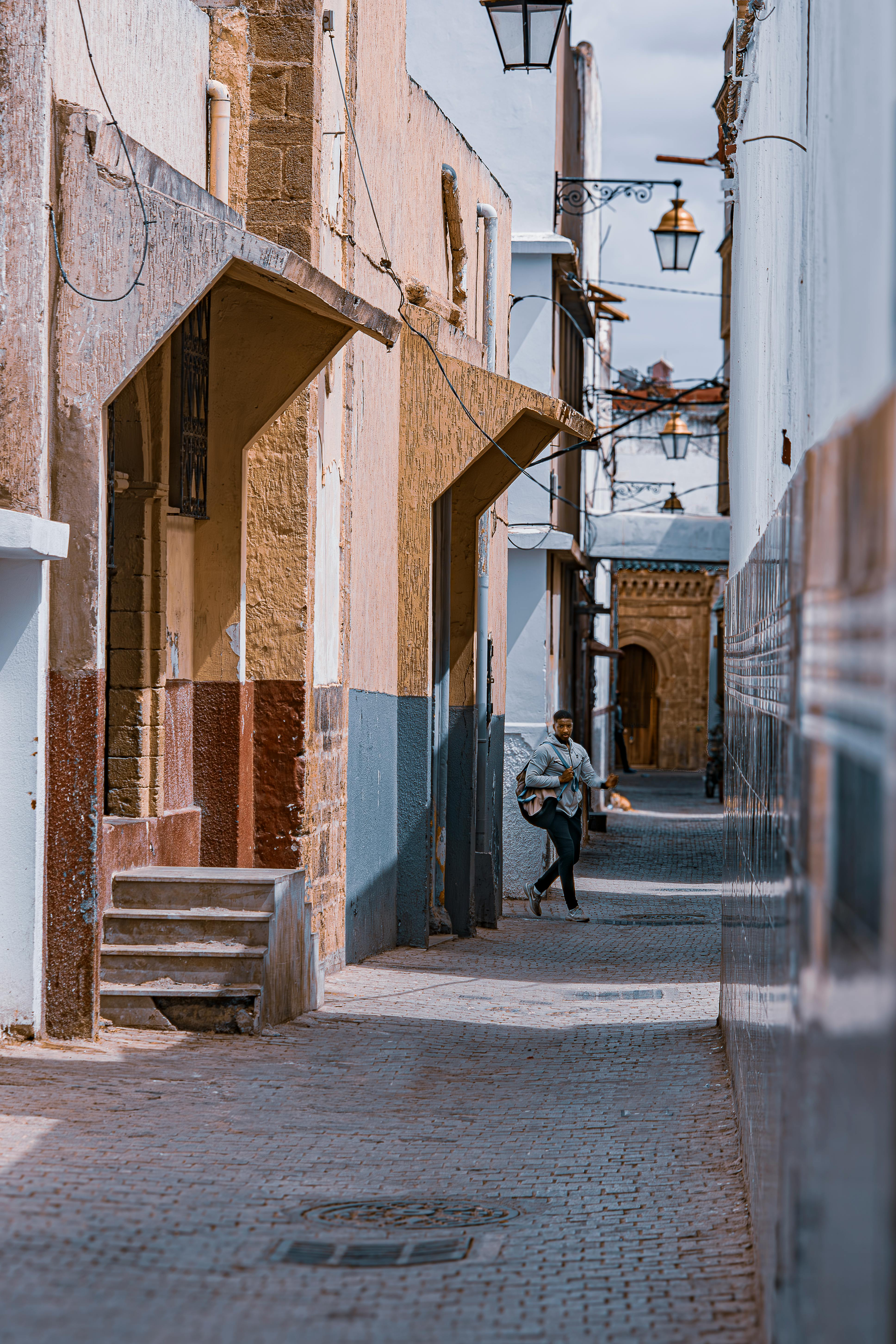 Colorful Decorations over the Cobblestone Alley of Mexican City Oaxaca ...