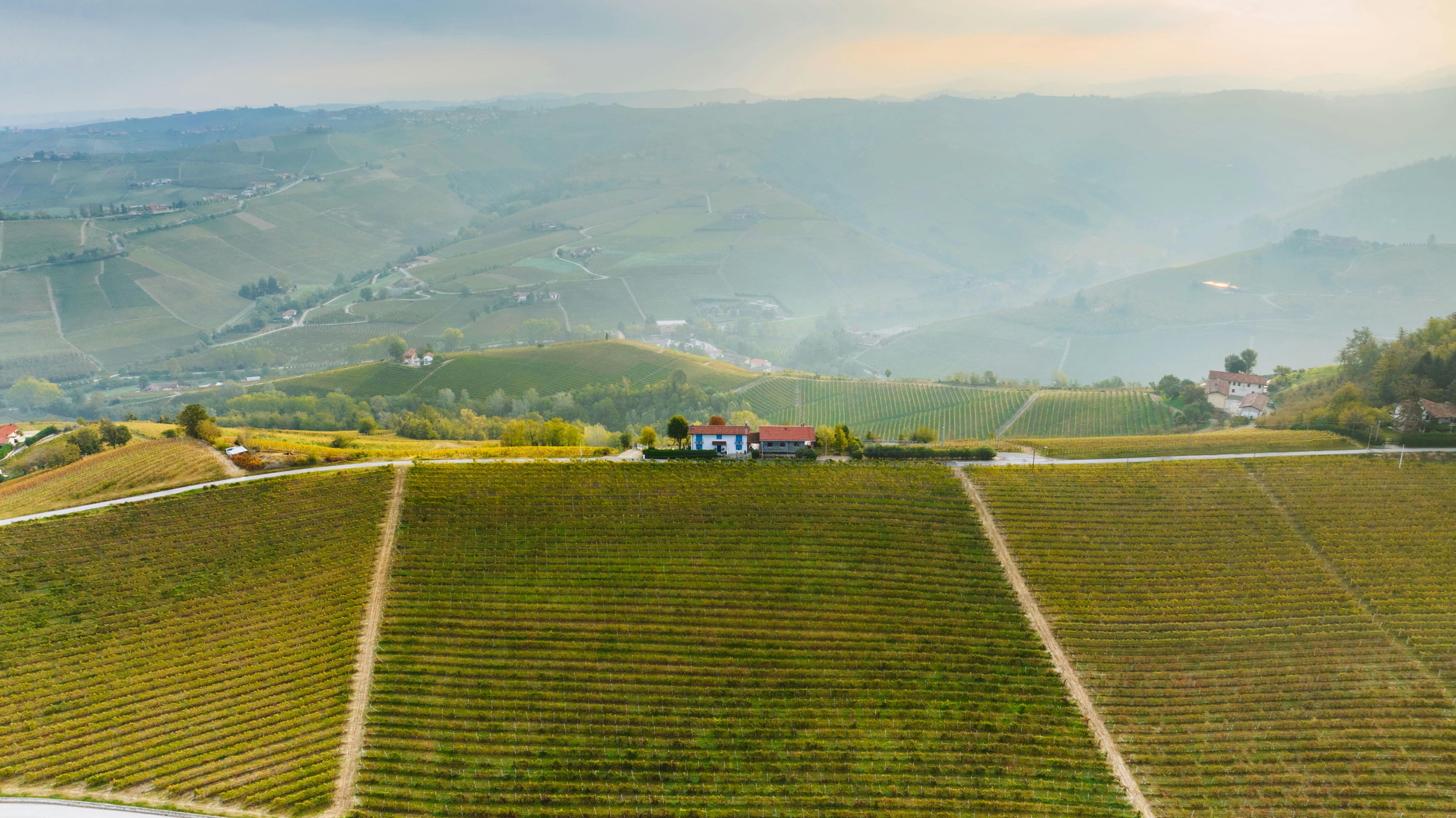 Plains with Village and Lake behind · Free Stock Photo