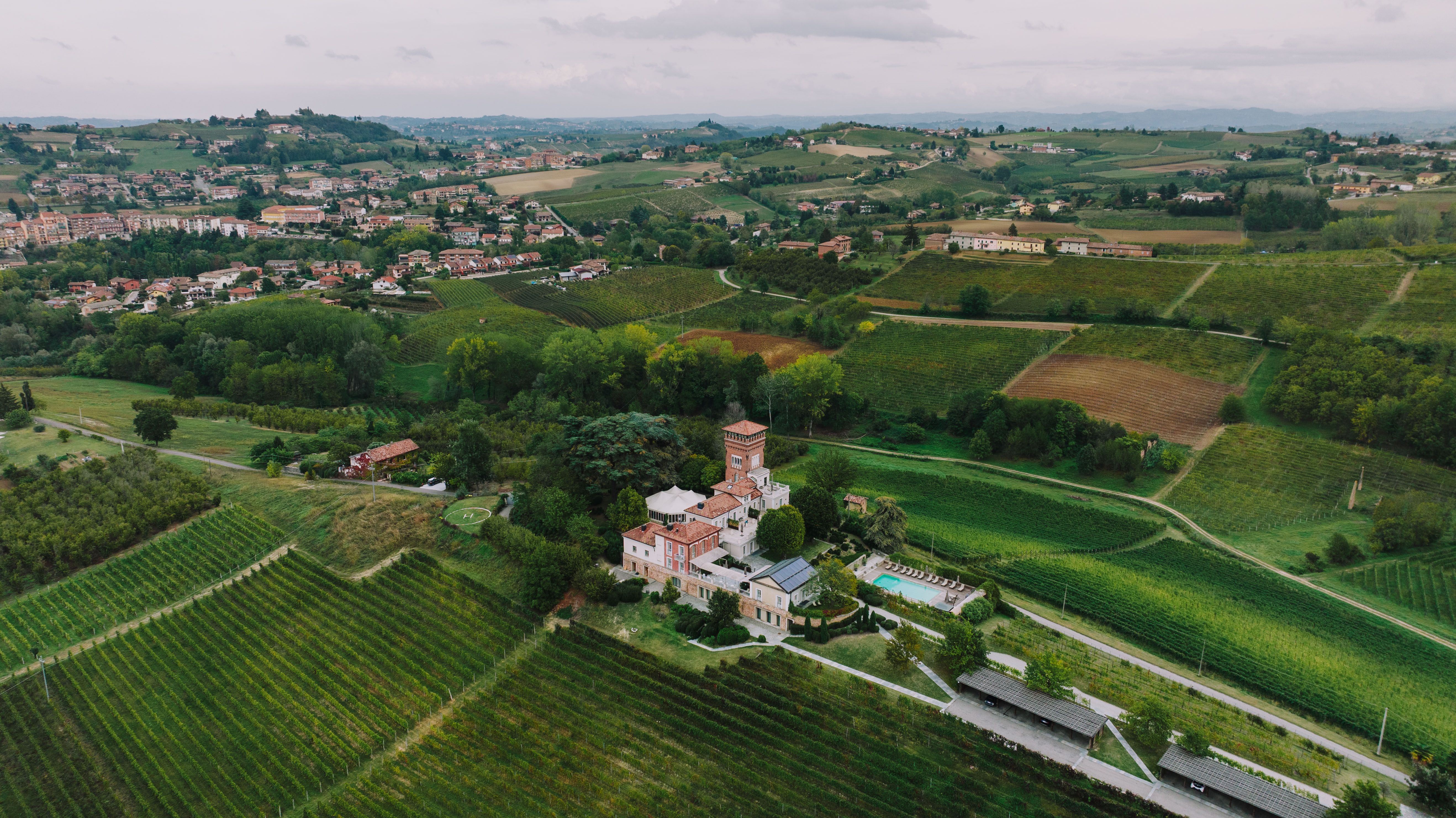Aerial Photo of a Town and Fields · Free Stock Photo