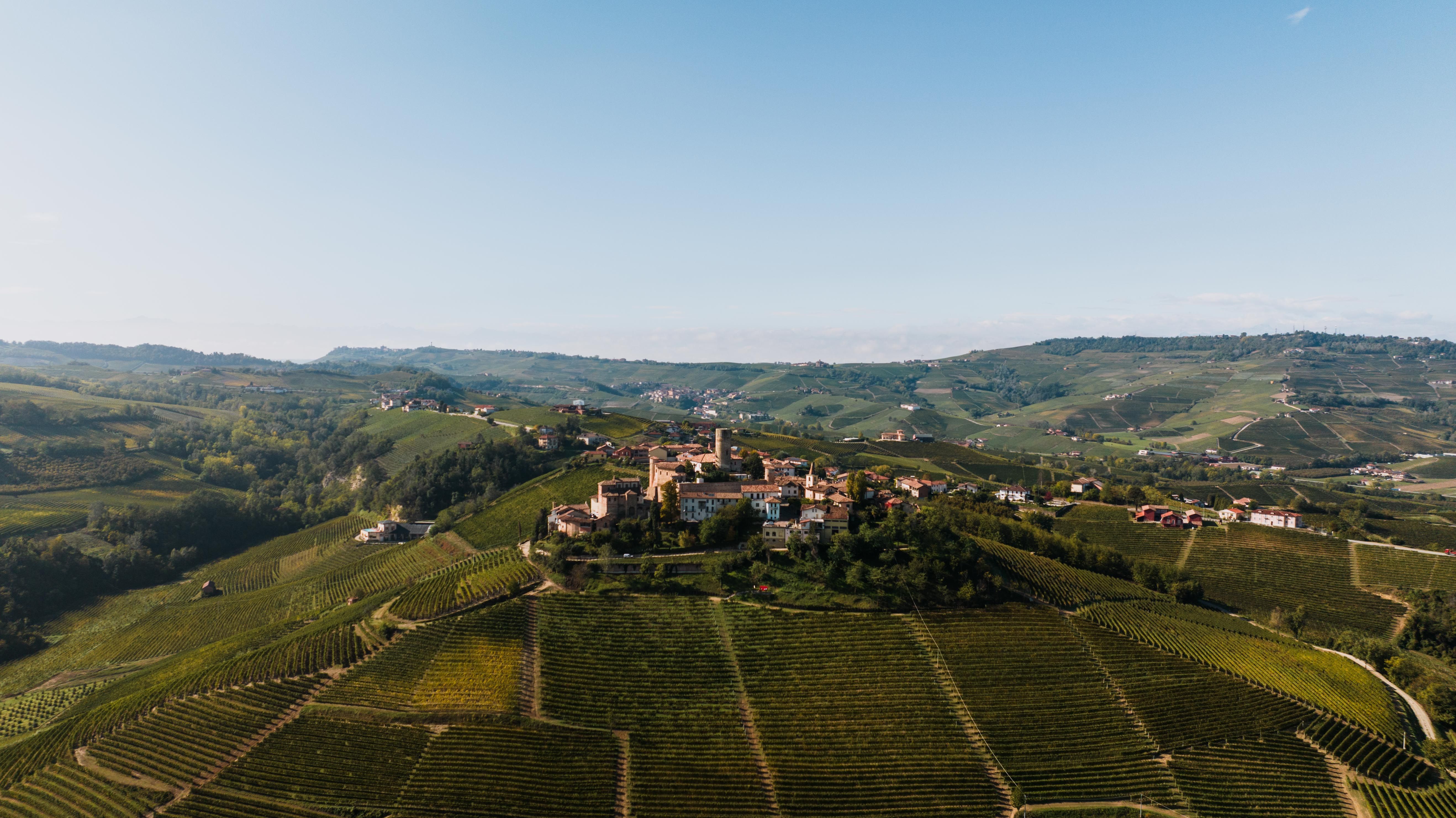 Sinio Town in Mountains Surrounded by Vineyards · Free Stock Photo