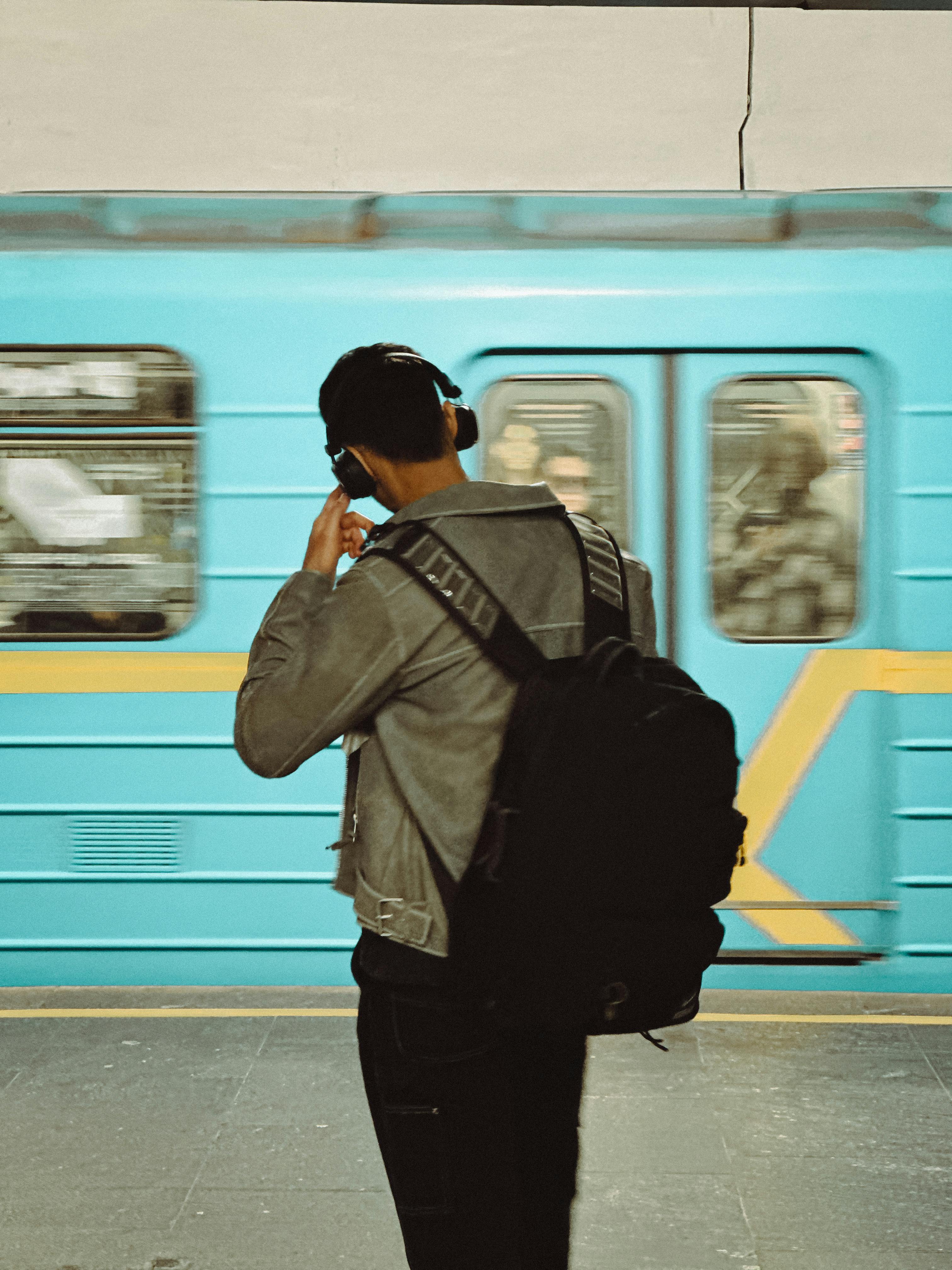Man Standing in Subway Station · Free Stock Photo