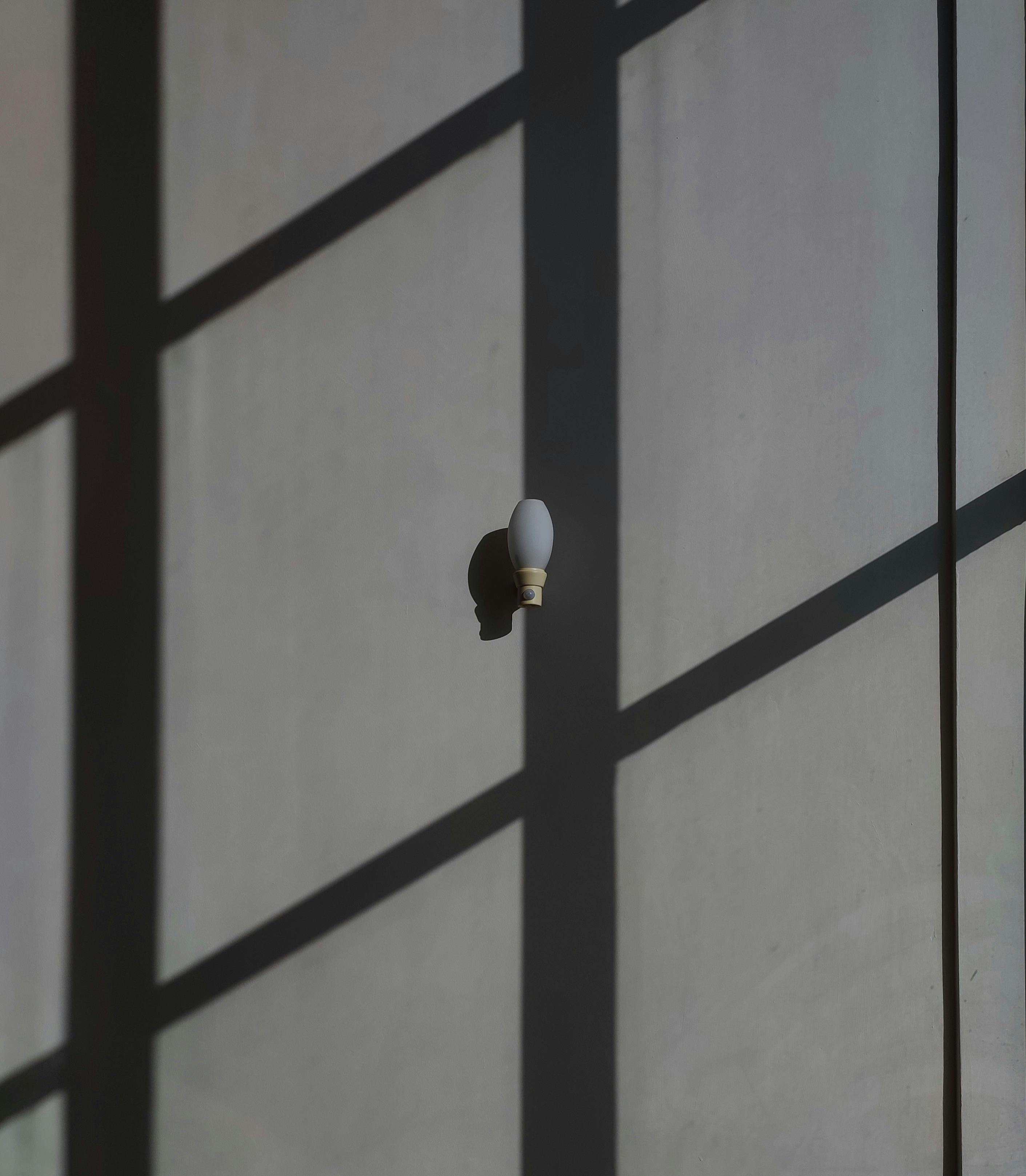 Metal Sconce Light Switched on during Night Time · Free Stock Photo