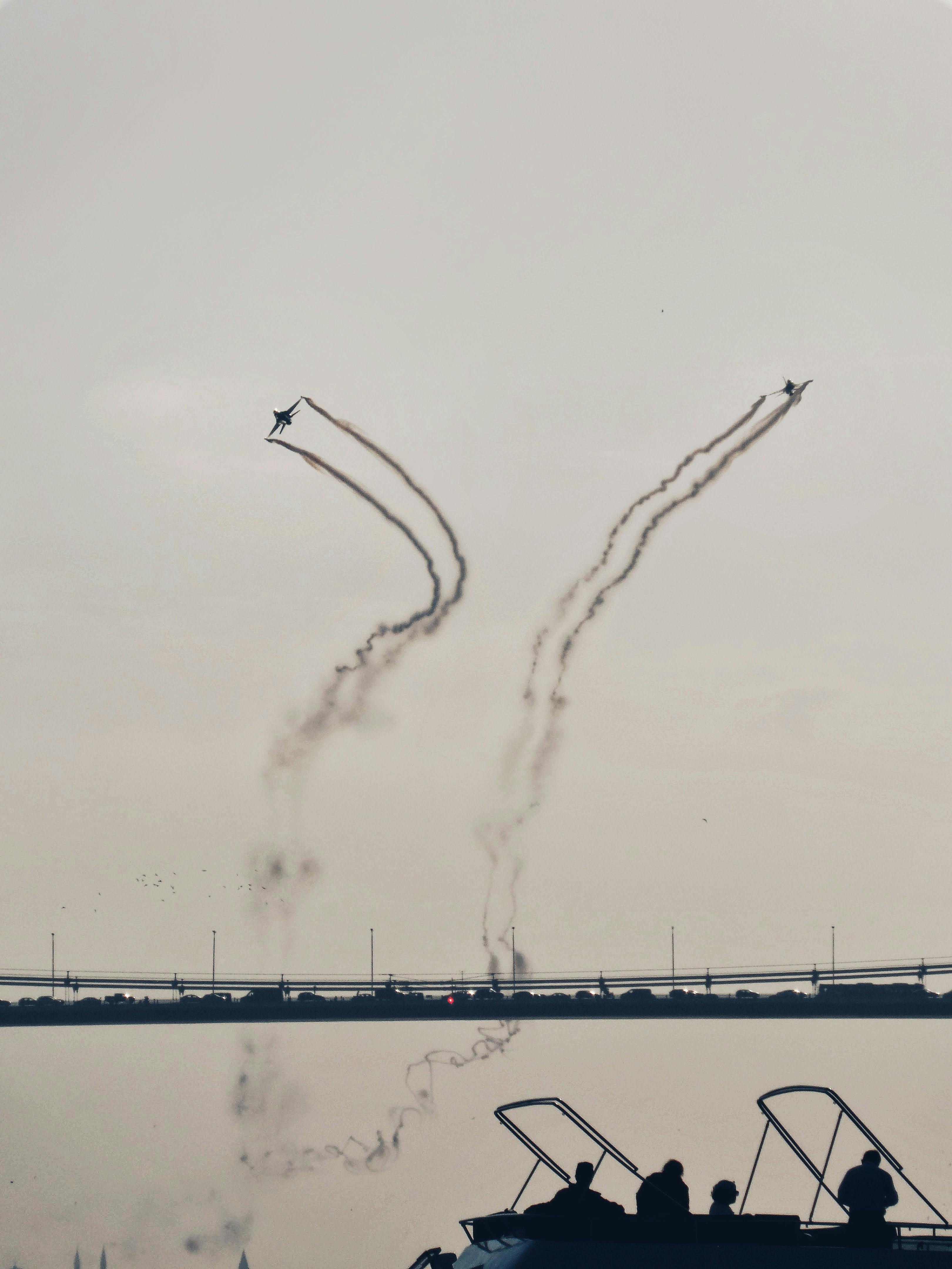 Planes Flying Above Lake · Free Stock Photo