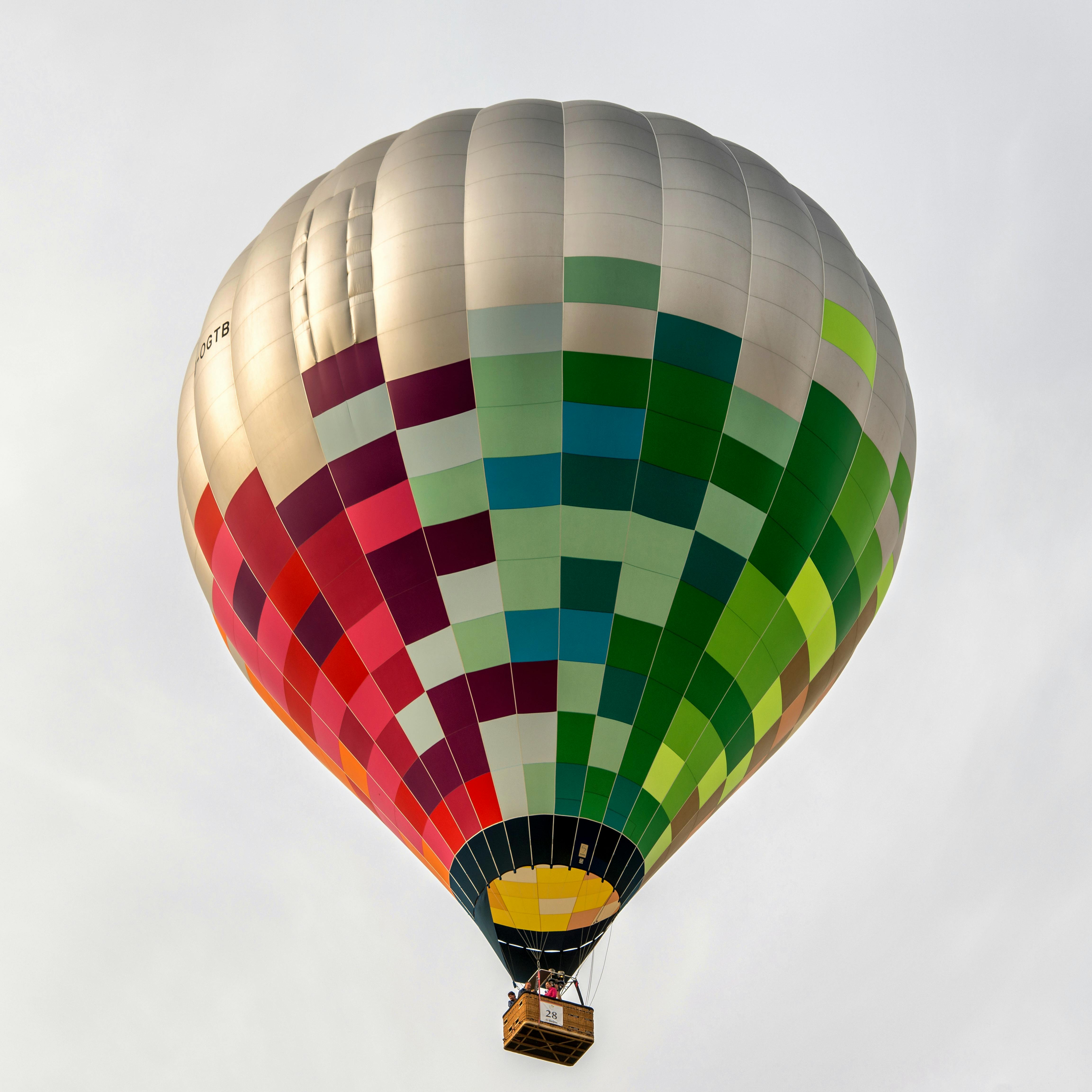 Colorful Balloon Flying in the Sky · Free Stock Photo