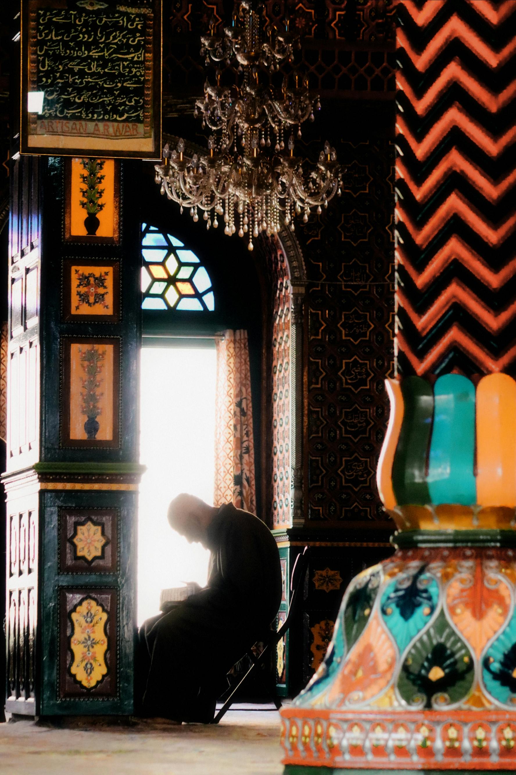 Man Praying in a Mosque · Free Stock Photo