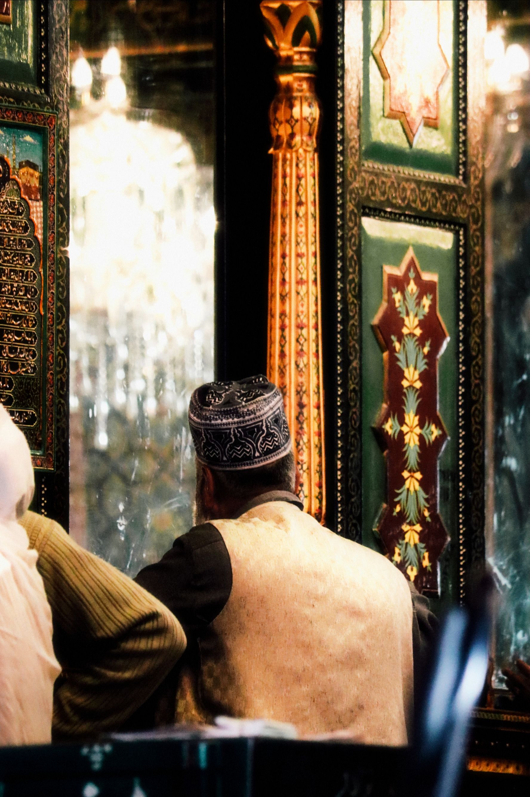 Man in Taqiyah Sitting inside Mosque · Free Stock Photo