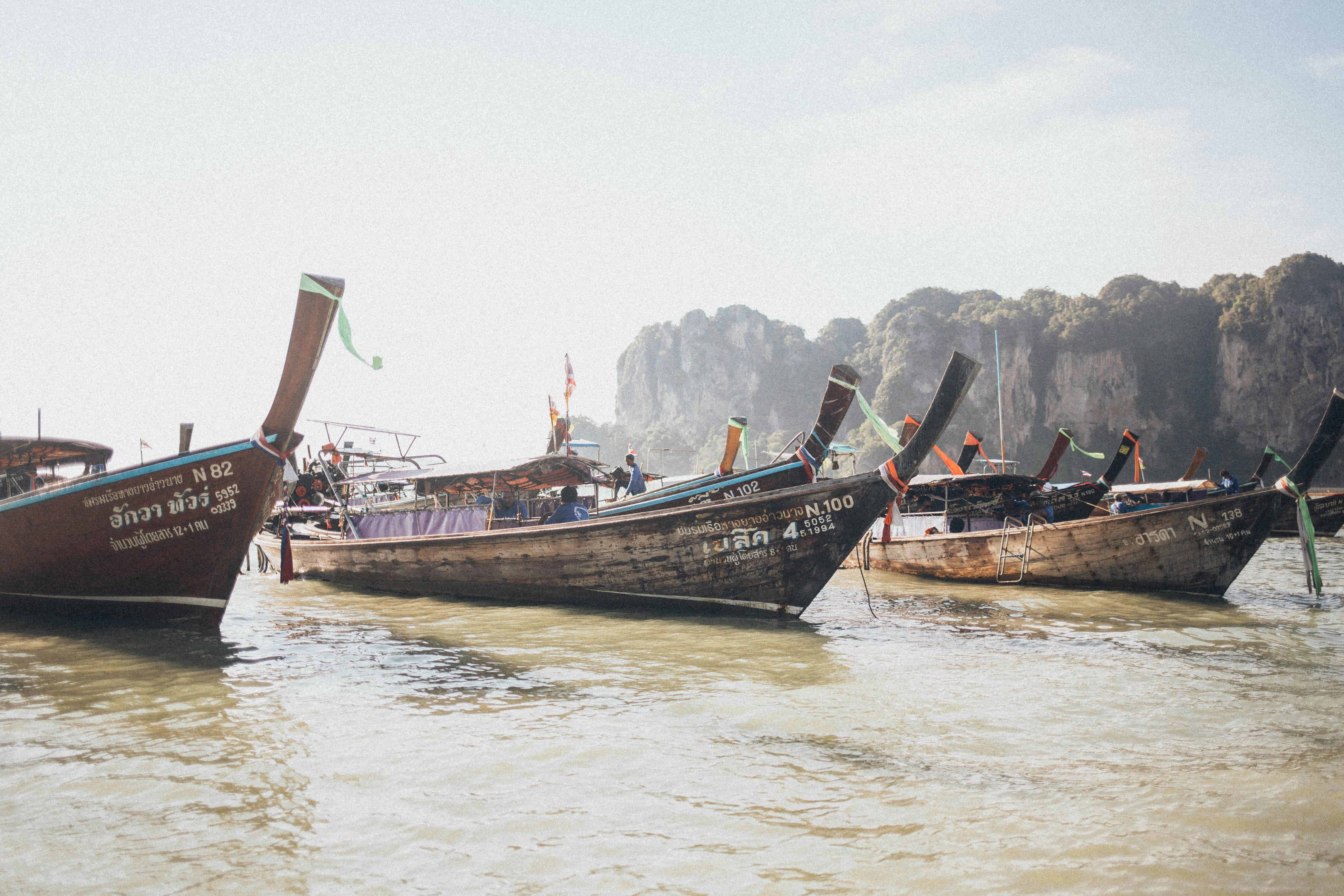 Three Gray Boats on Water · Free Stock Photo