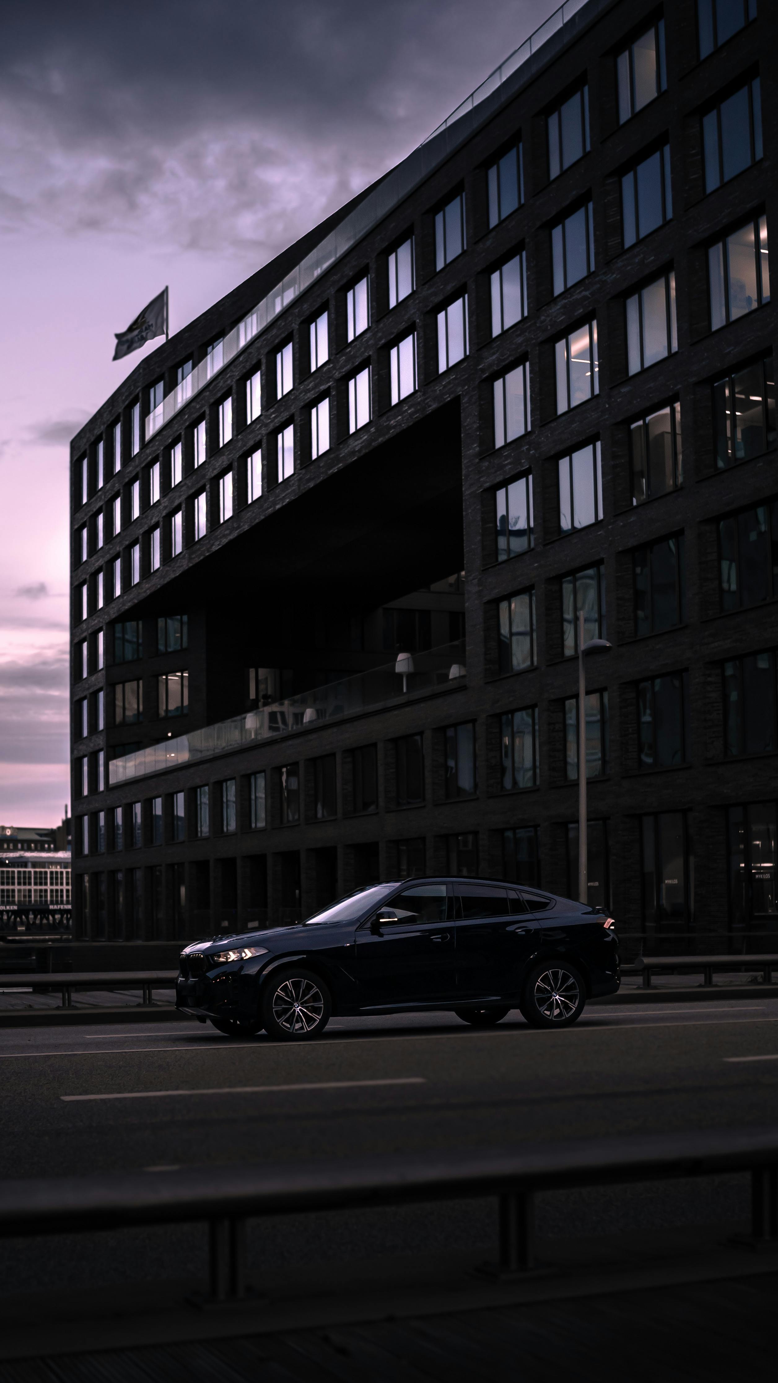 Car on Street near Building · Free Stock Photo