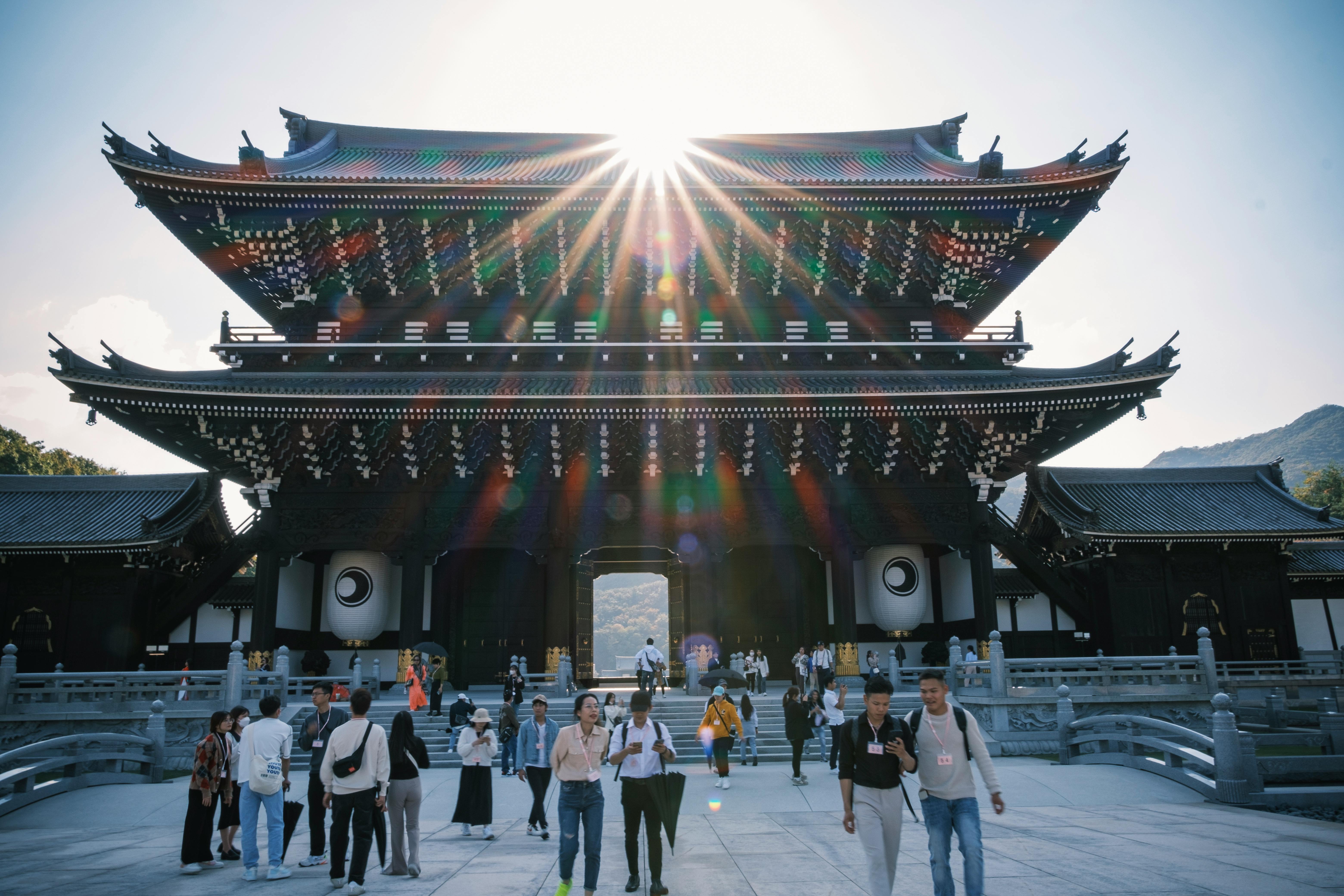 Tourists Visiting a Traditional Temple · Free Stock Photo