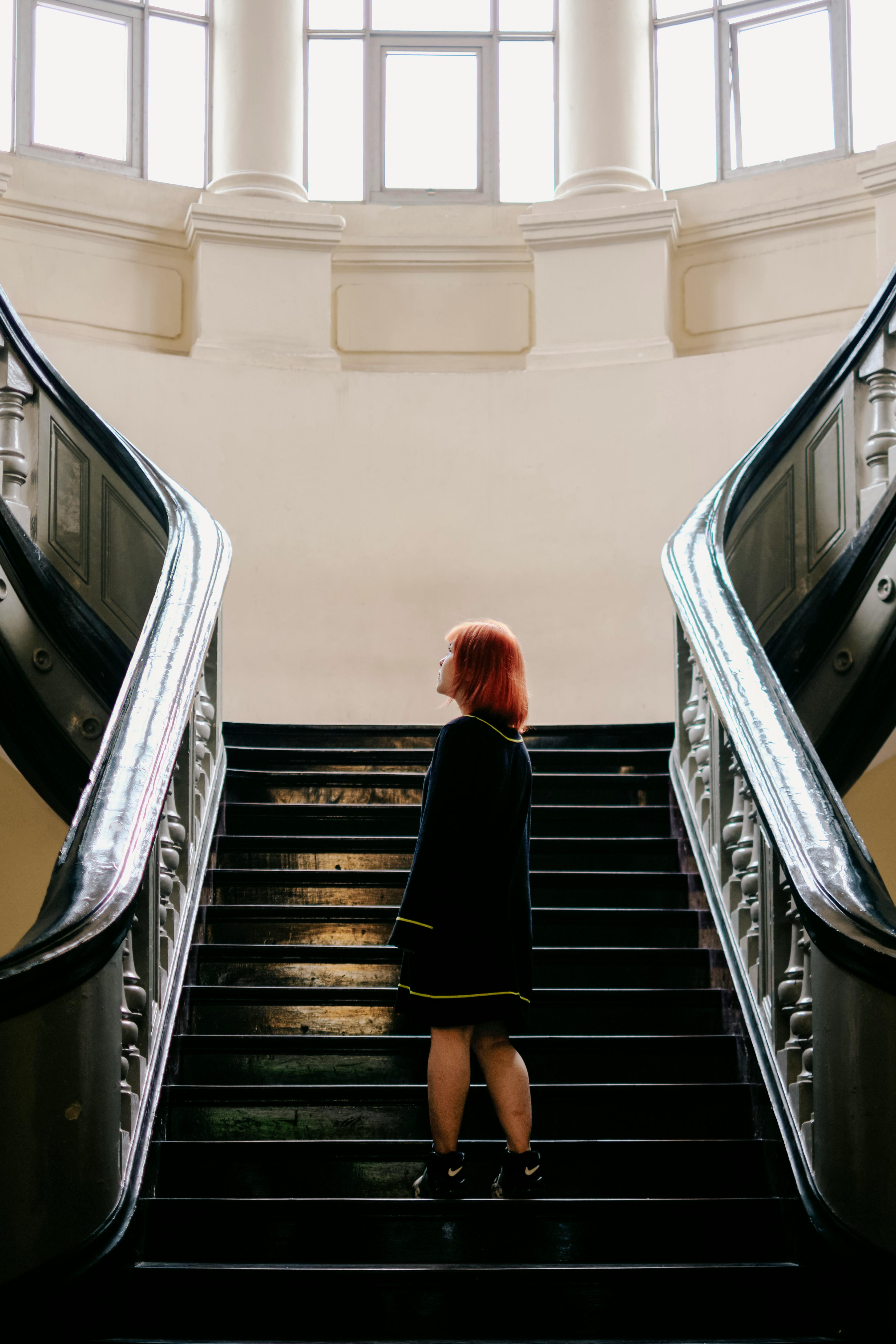 Woman Standing Near Railings · Free Stock Photo