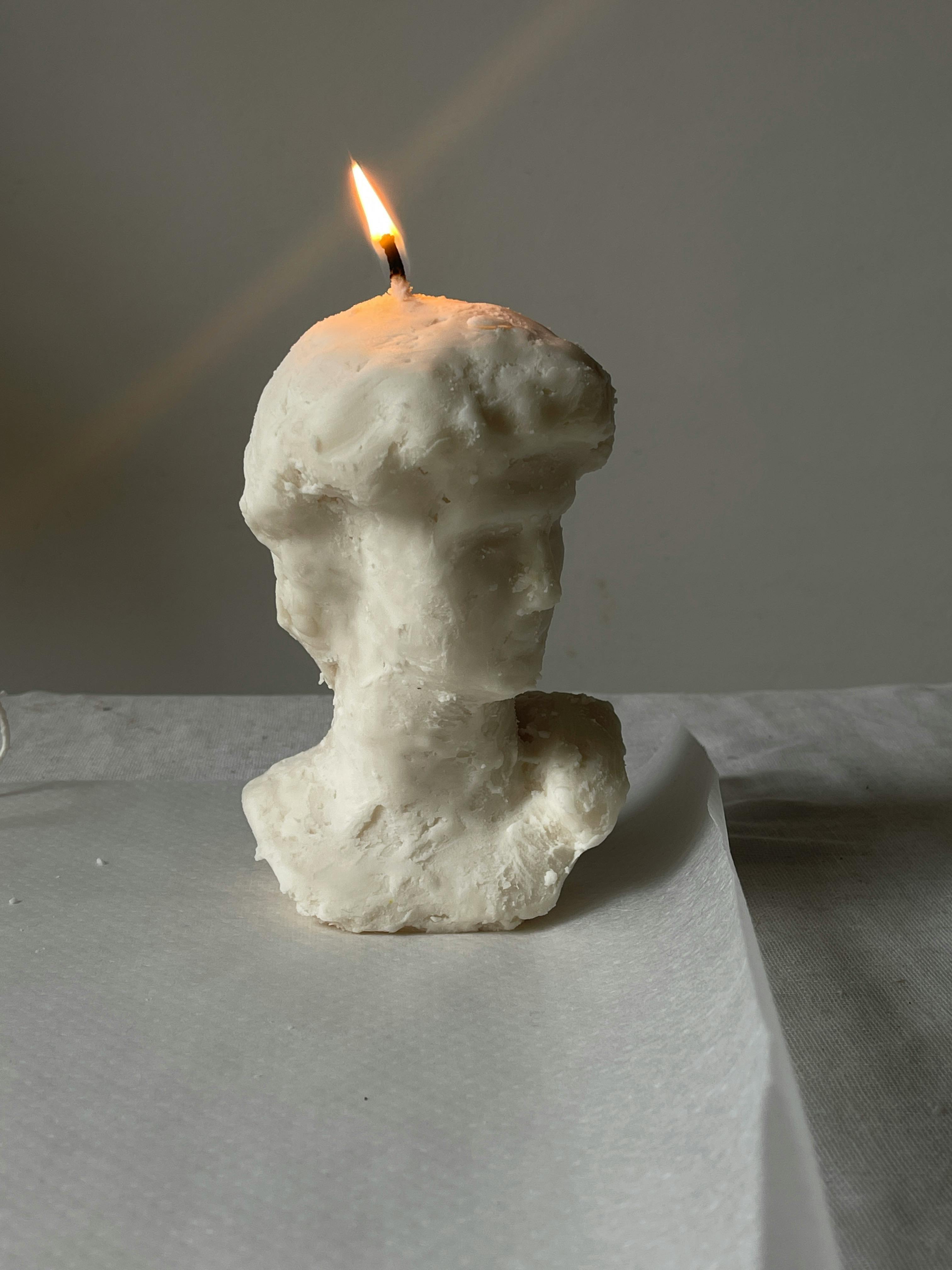A Body Shaped Candle in the Dark · Free Stock Photo