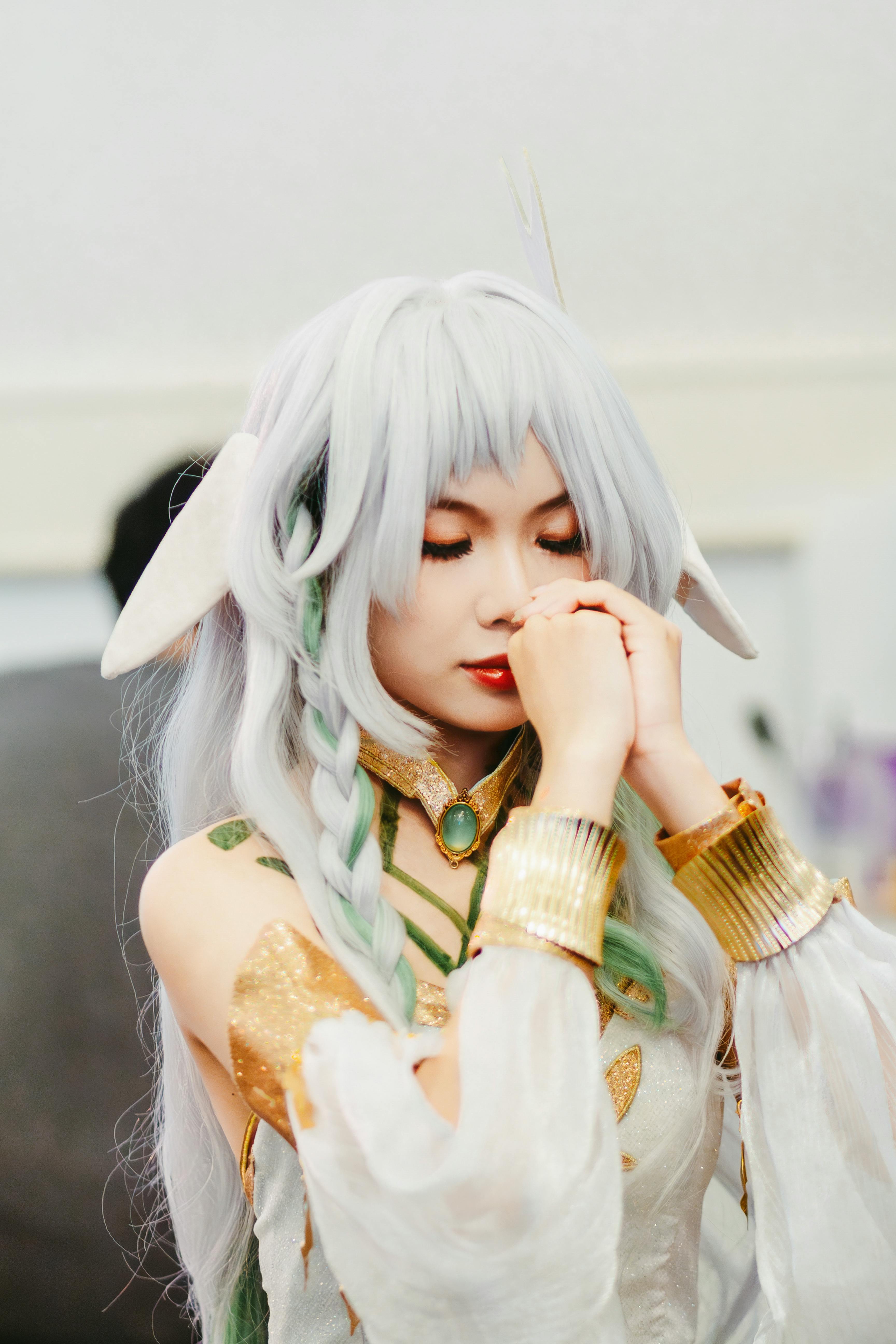 Woman Focusing in Cosplay Costume · Free Stock Photo