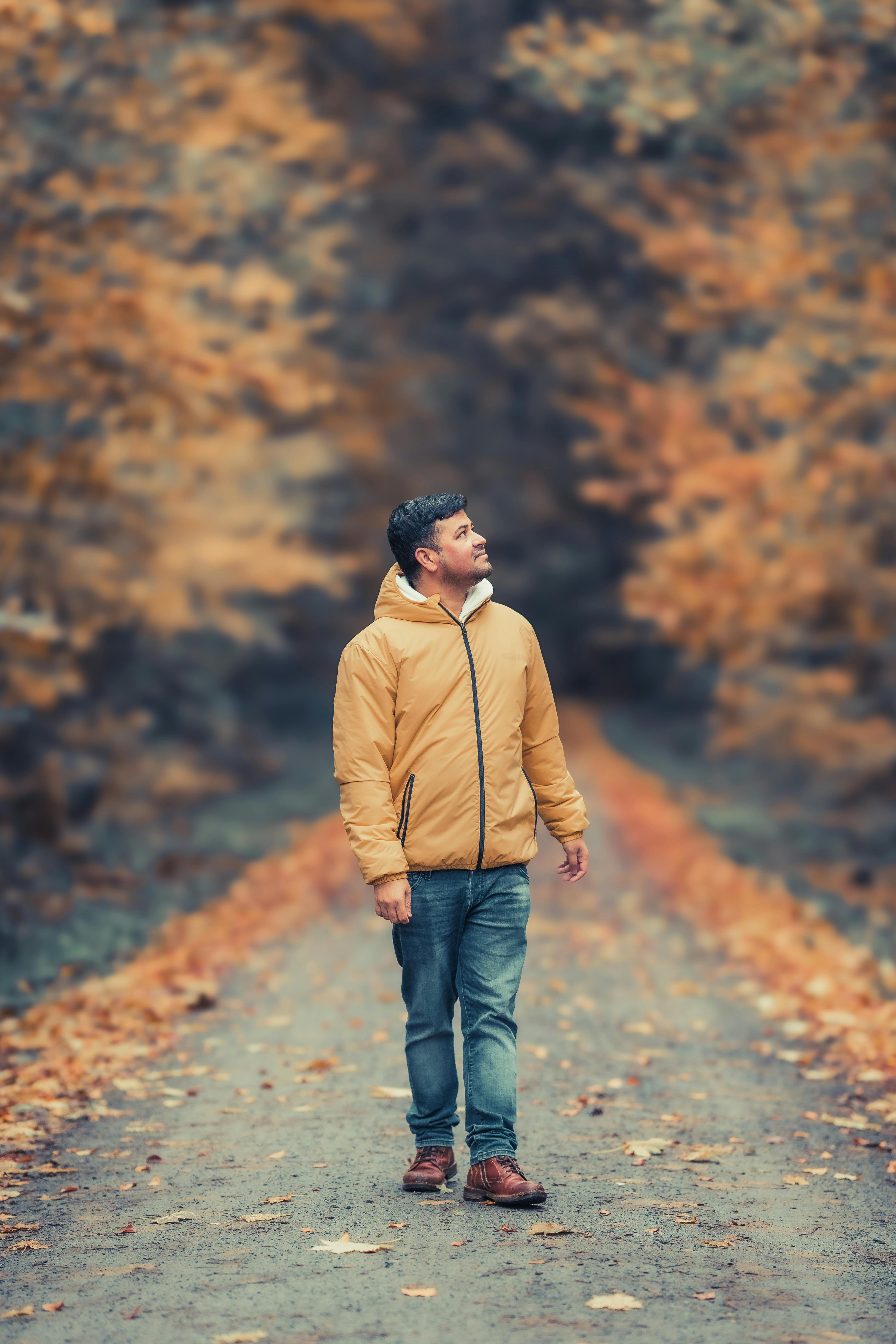 Man Walking on a Path in Fall · Free Stock Photo