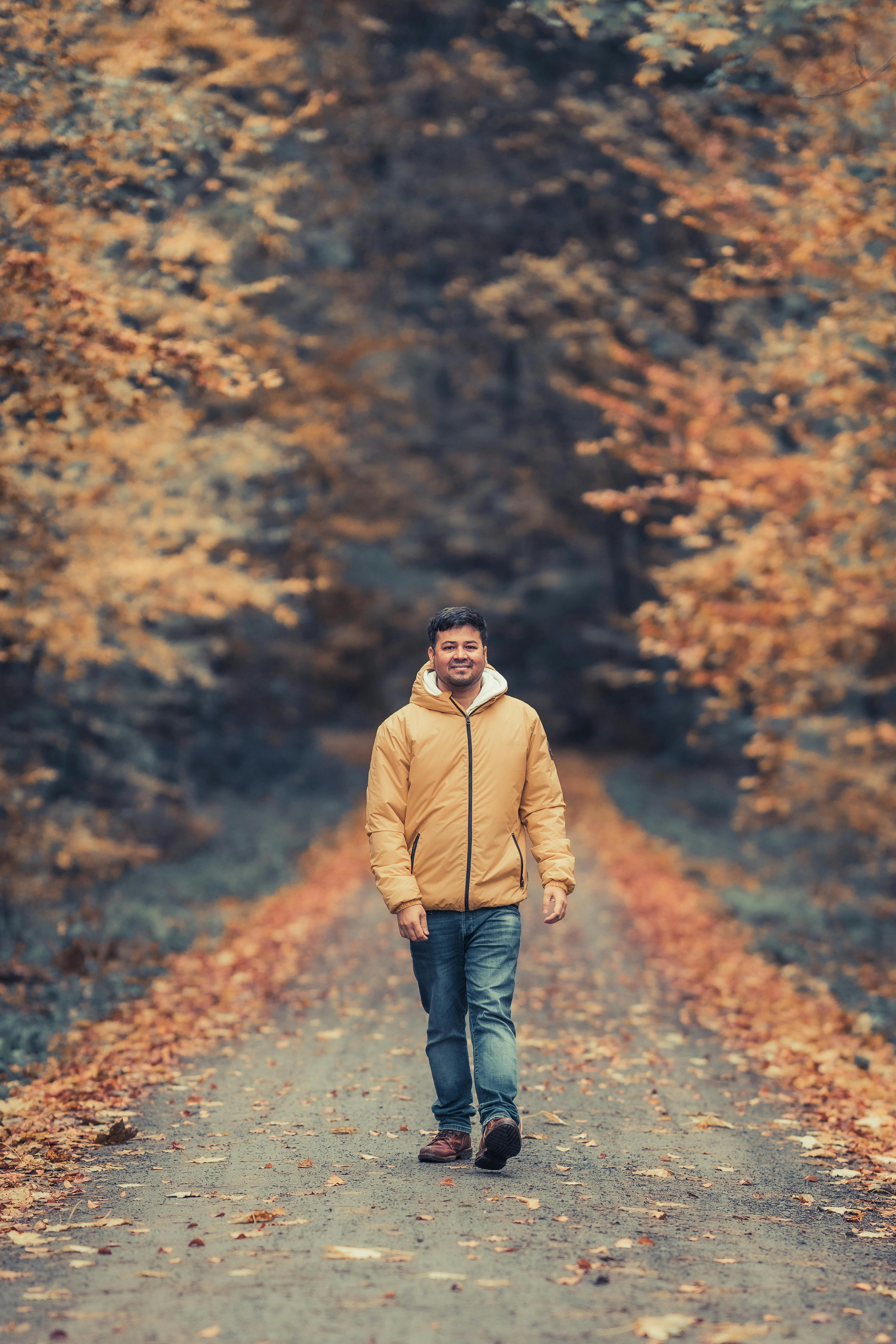 Man Walking in Park in Autumn · Free Stock Photo