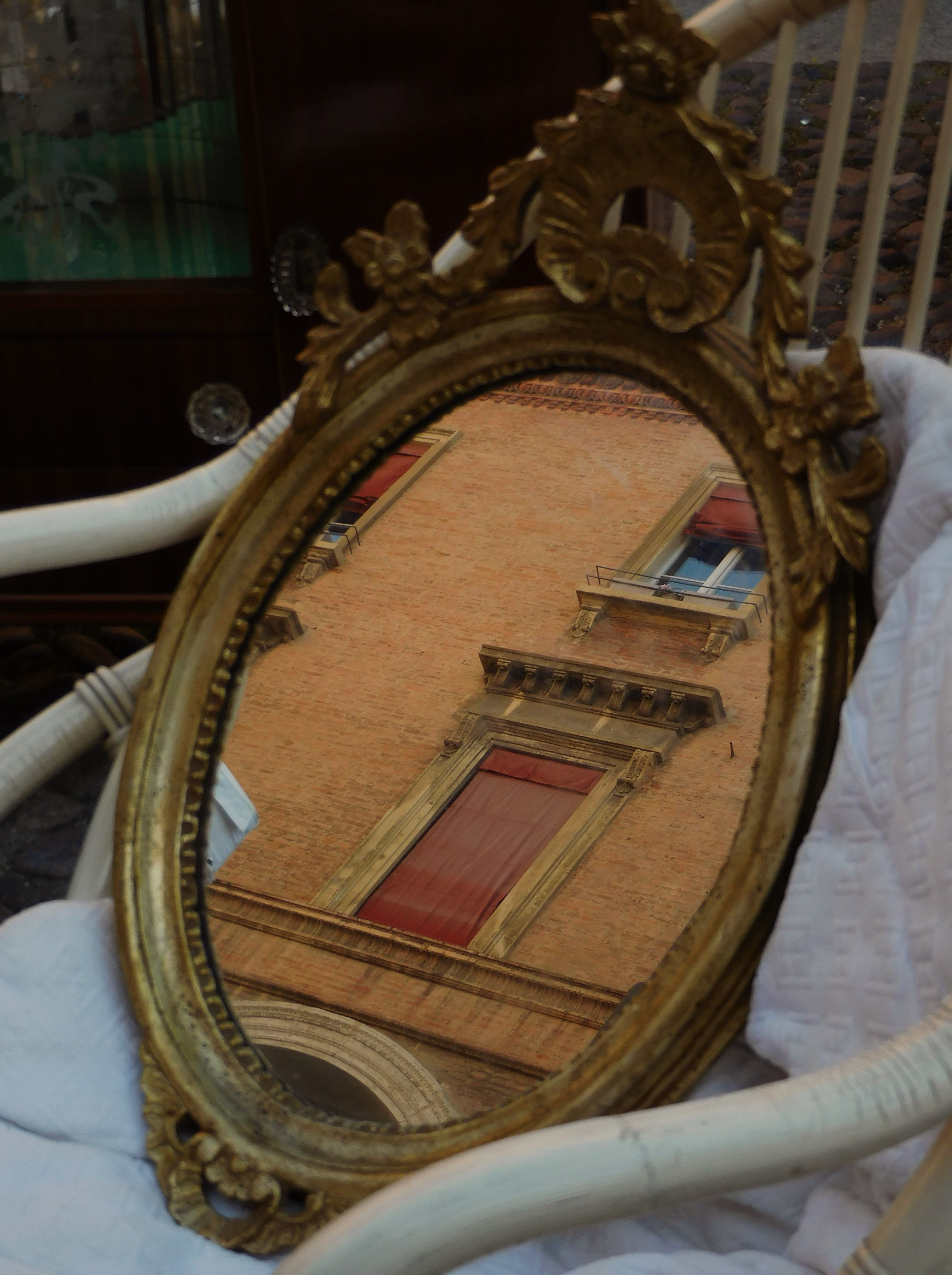Reflection of Residential Building Mirror in Oval Wooden Golden Frame ...