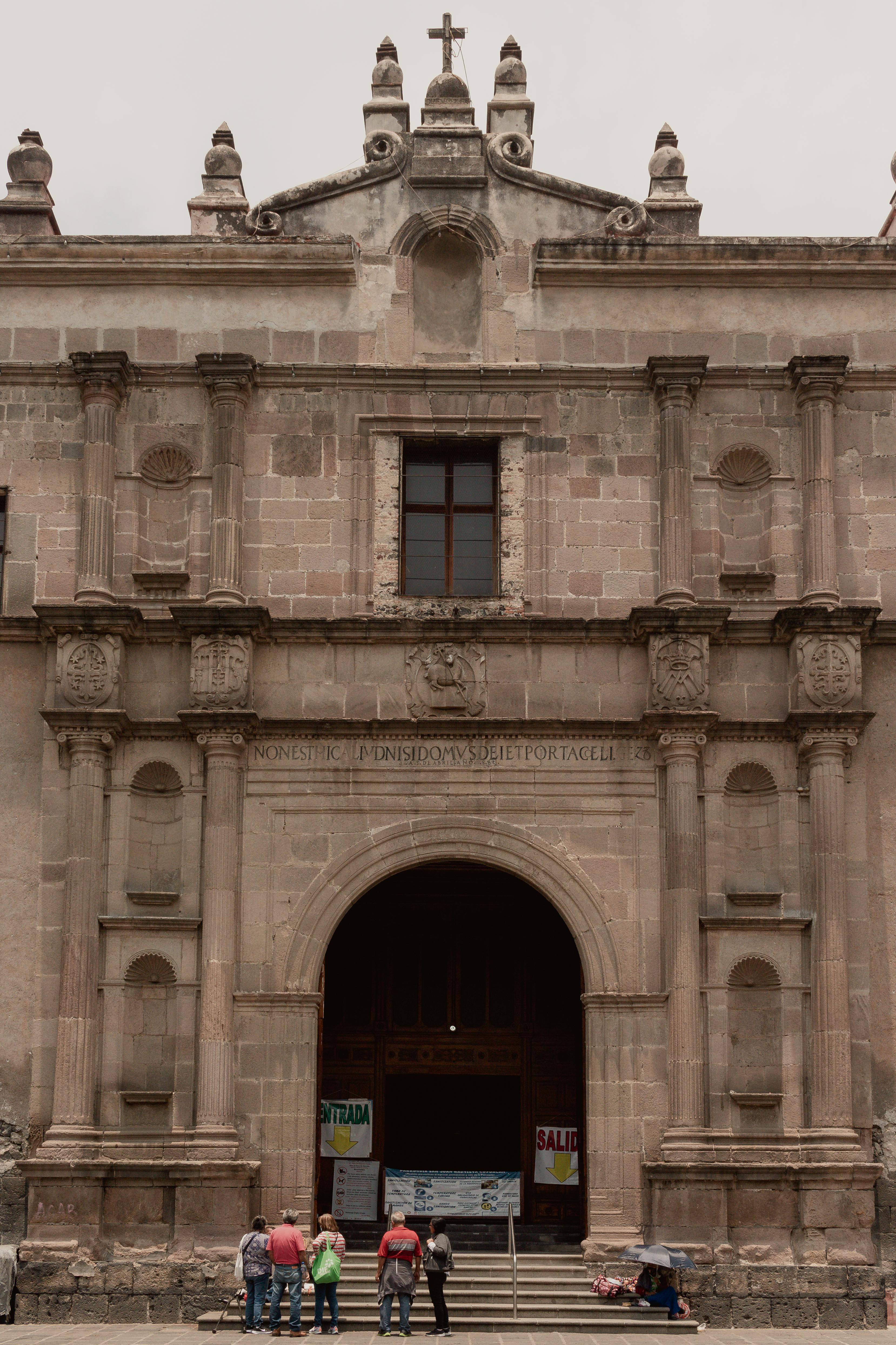 Mexico Flag on Brown 2-storey Building · Free Stock Photo