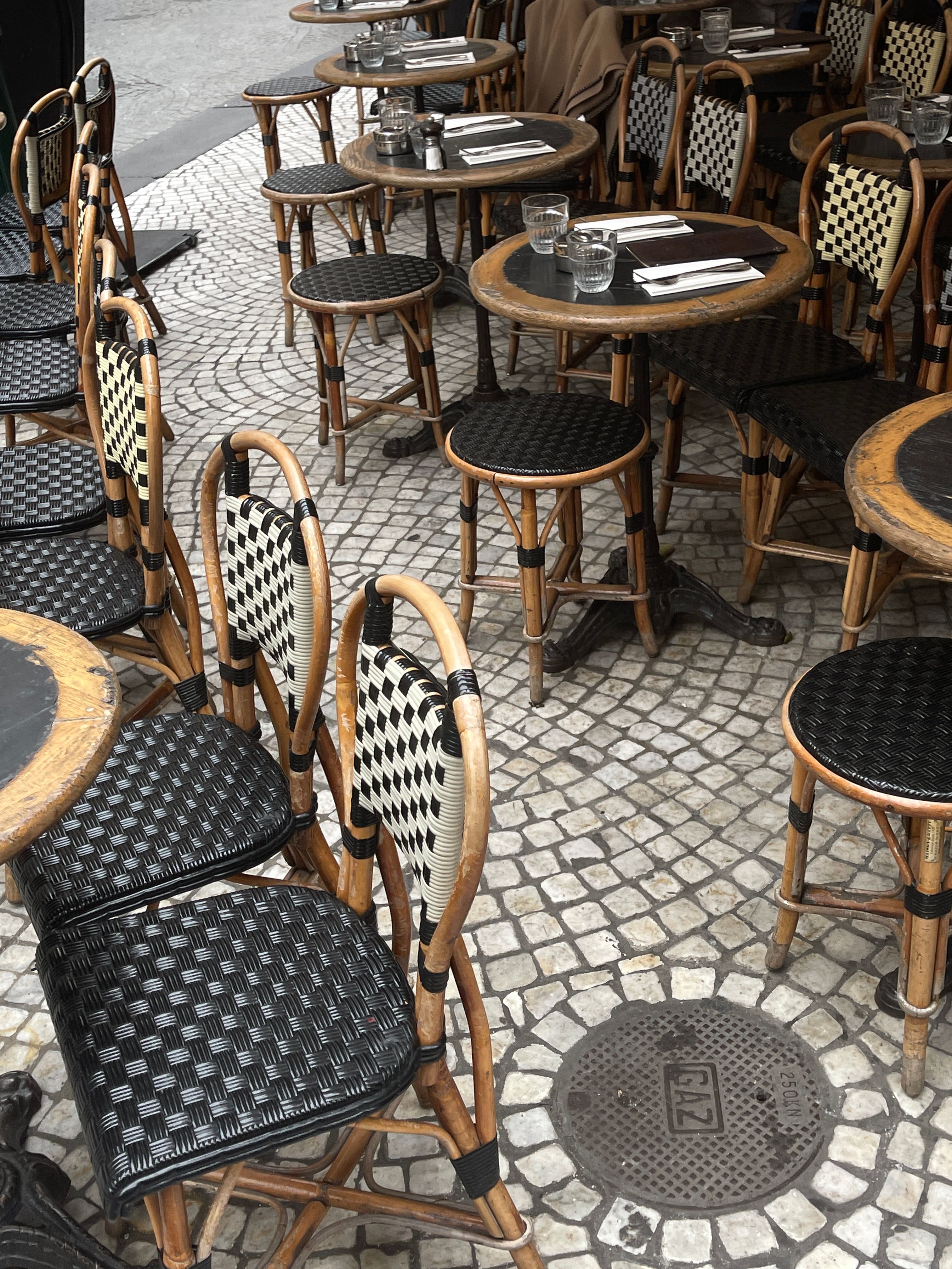 Chairs and Tables in Front of a Restaurant · Free Stock Photo