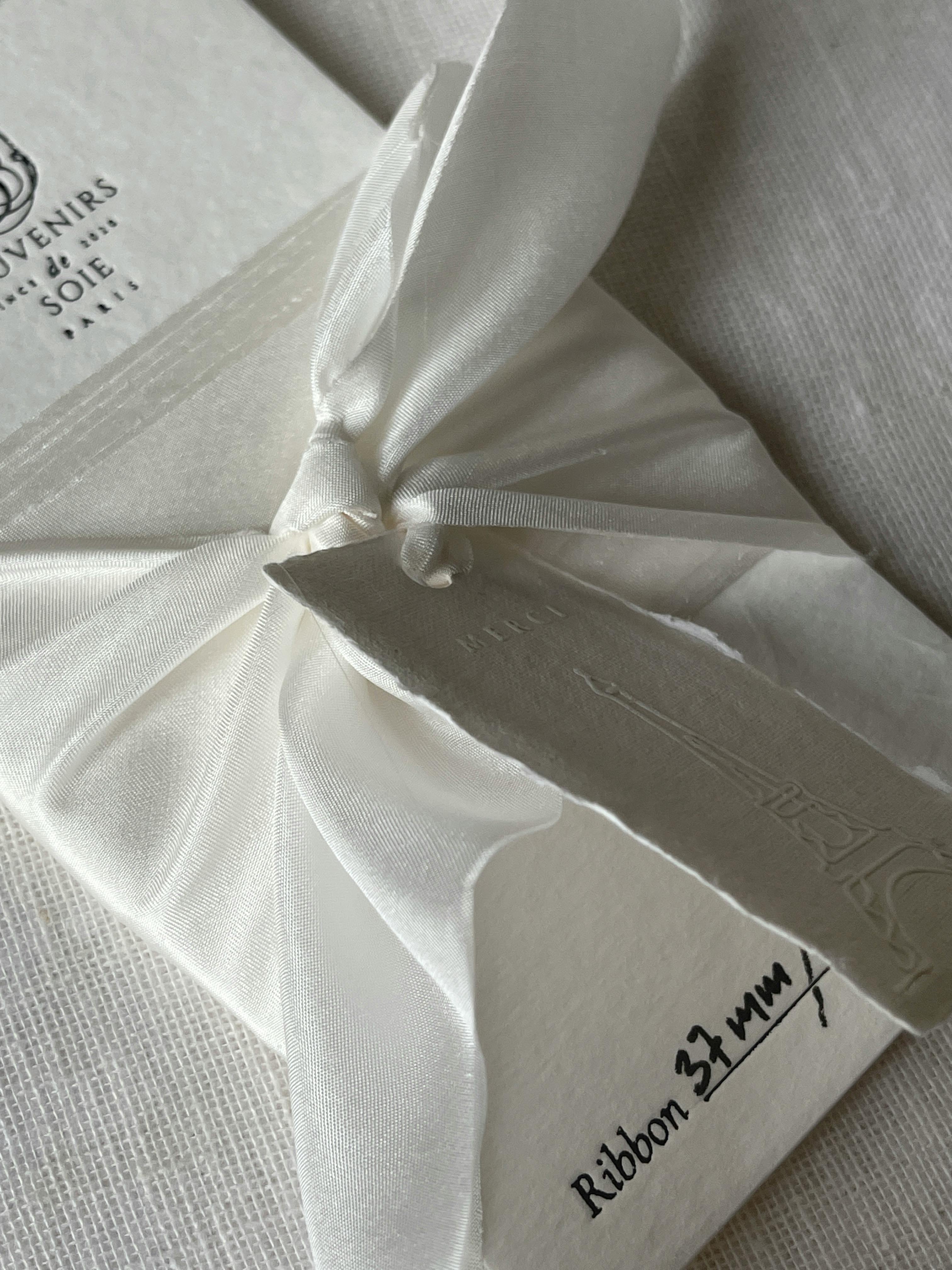 Elegant Ribbon on Paper Card · Free Stock Photo