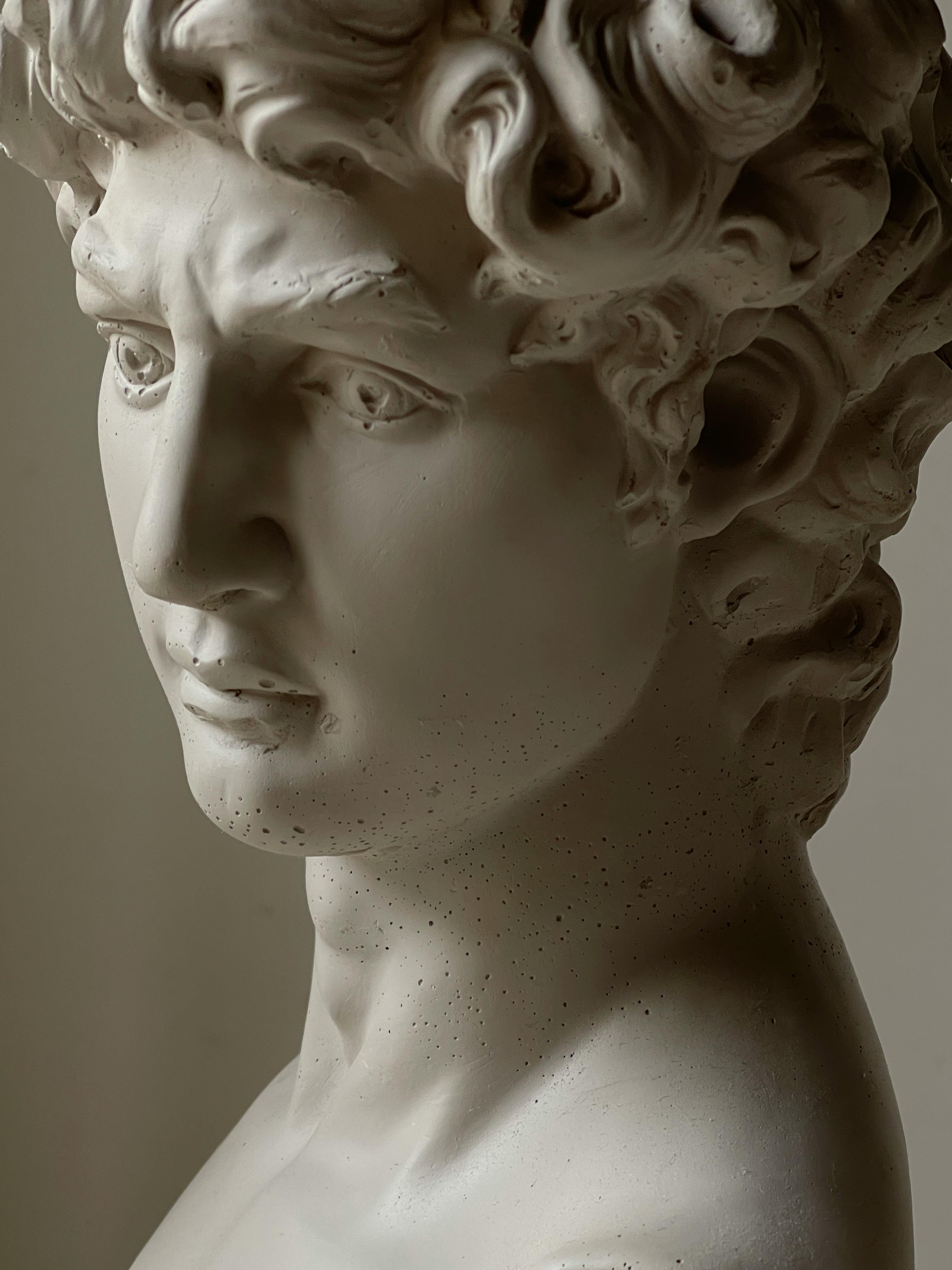 Ancient Sculpture of a Man · Free Stock Photo