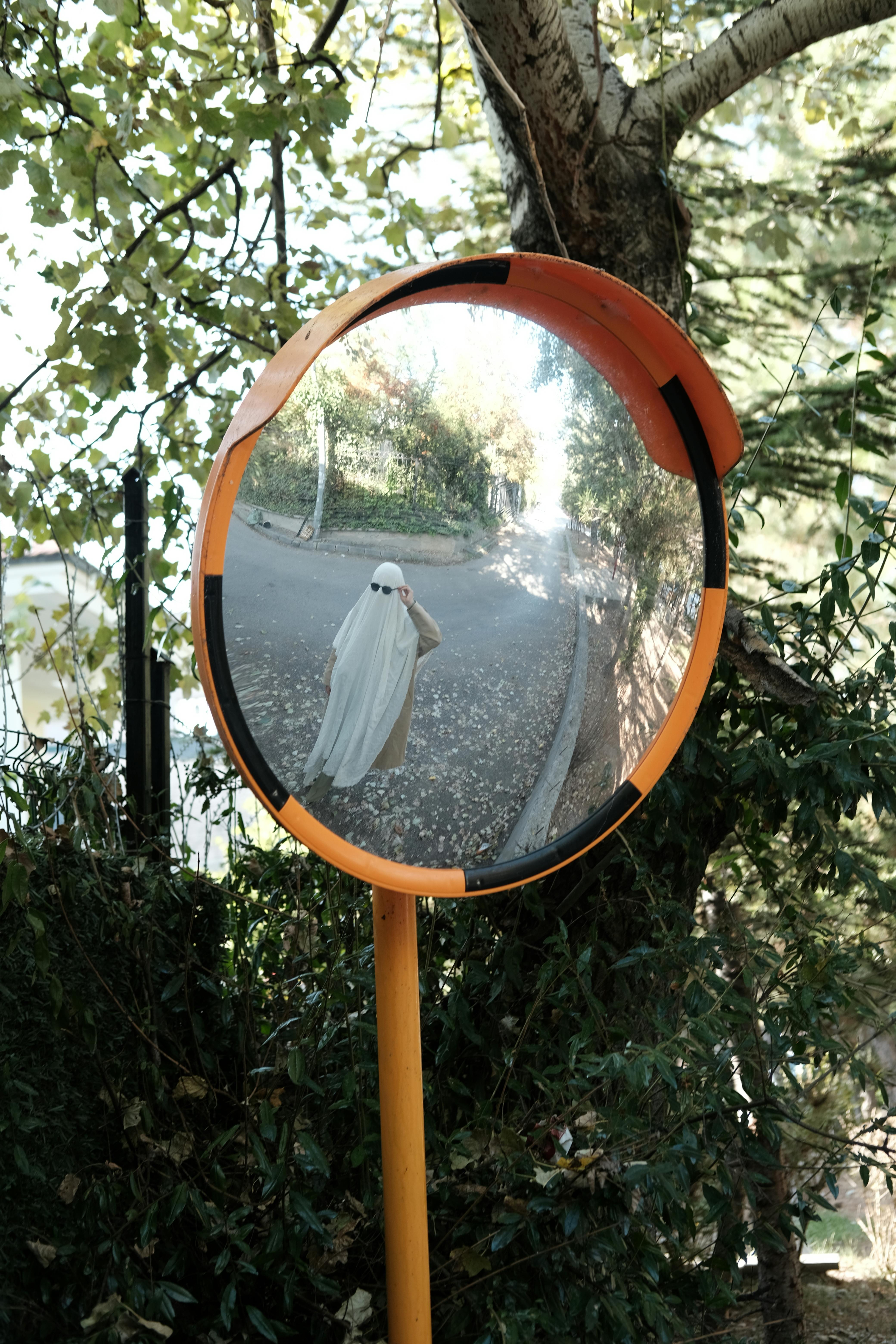 Ghost Reflection in Traffic Mirror · Free Stock Photo