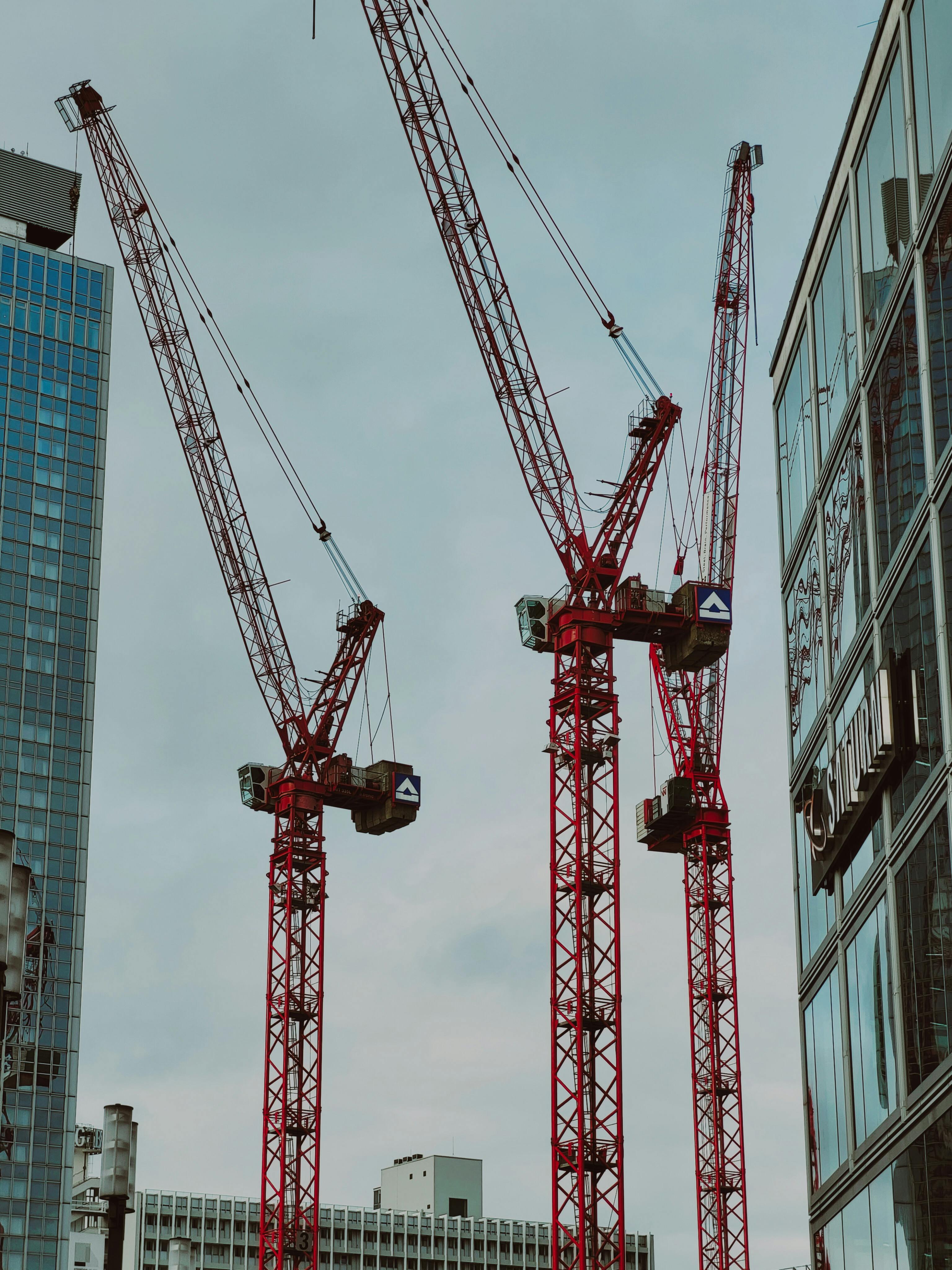 Red Cranes on a Construction Site in the Middle of the City · Free ...