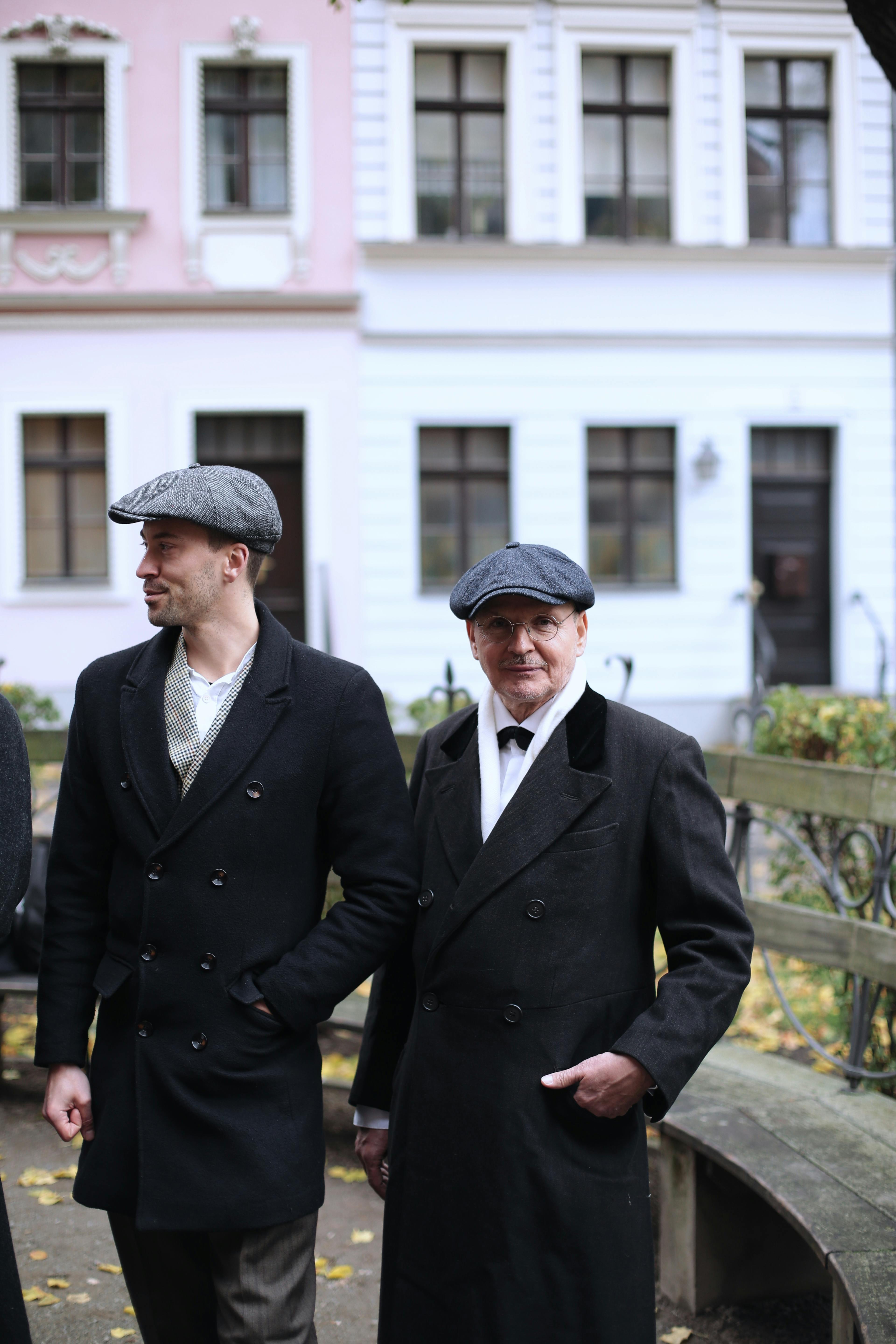 Two Men in Elegant Clothing in Front of a Building · Free Stock Photo