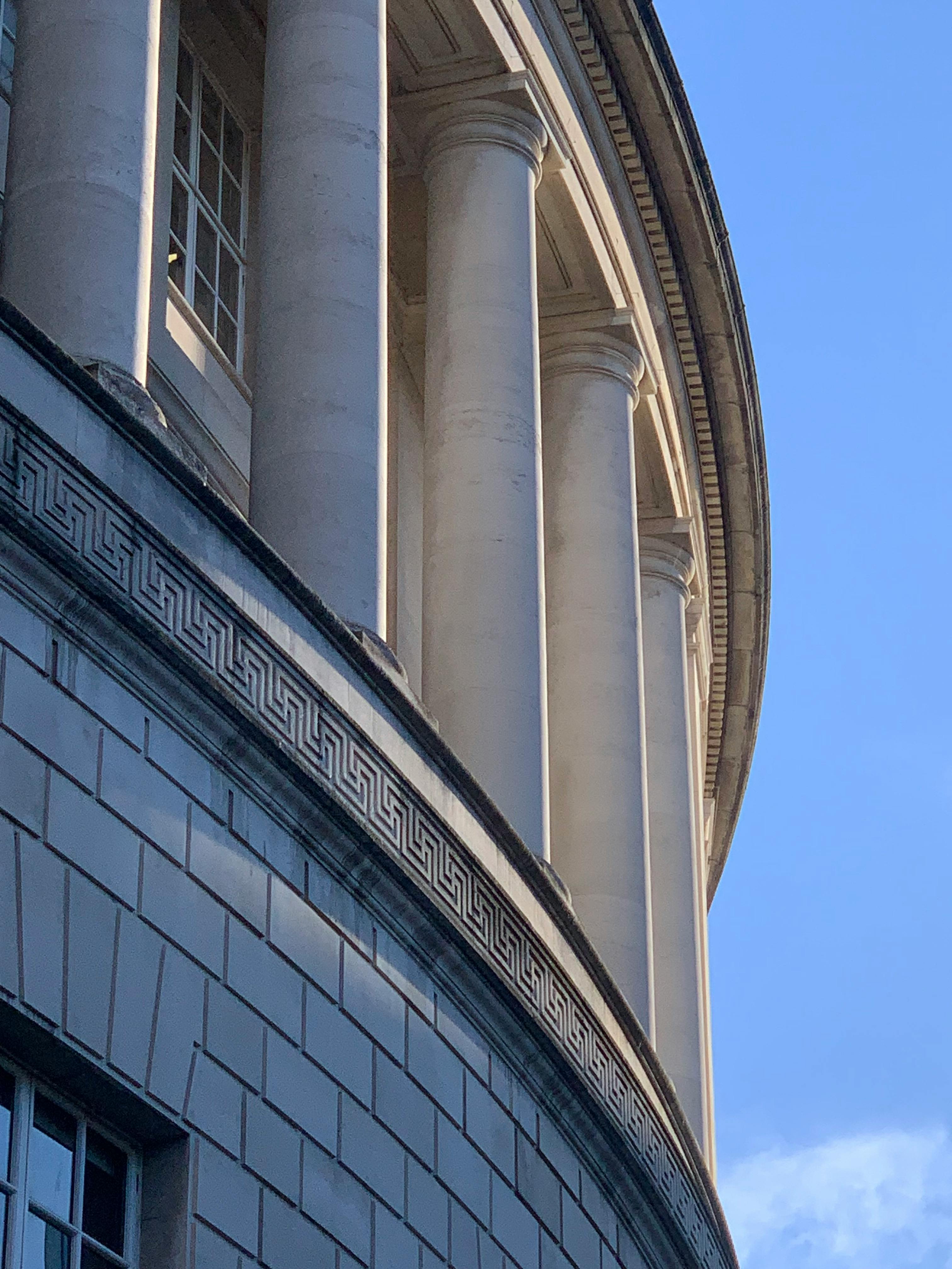 Neoclassical Facade with Corinthian Columns · Free Stock Photo