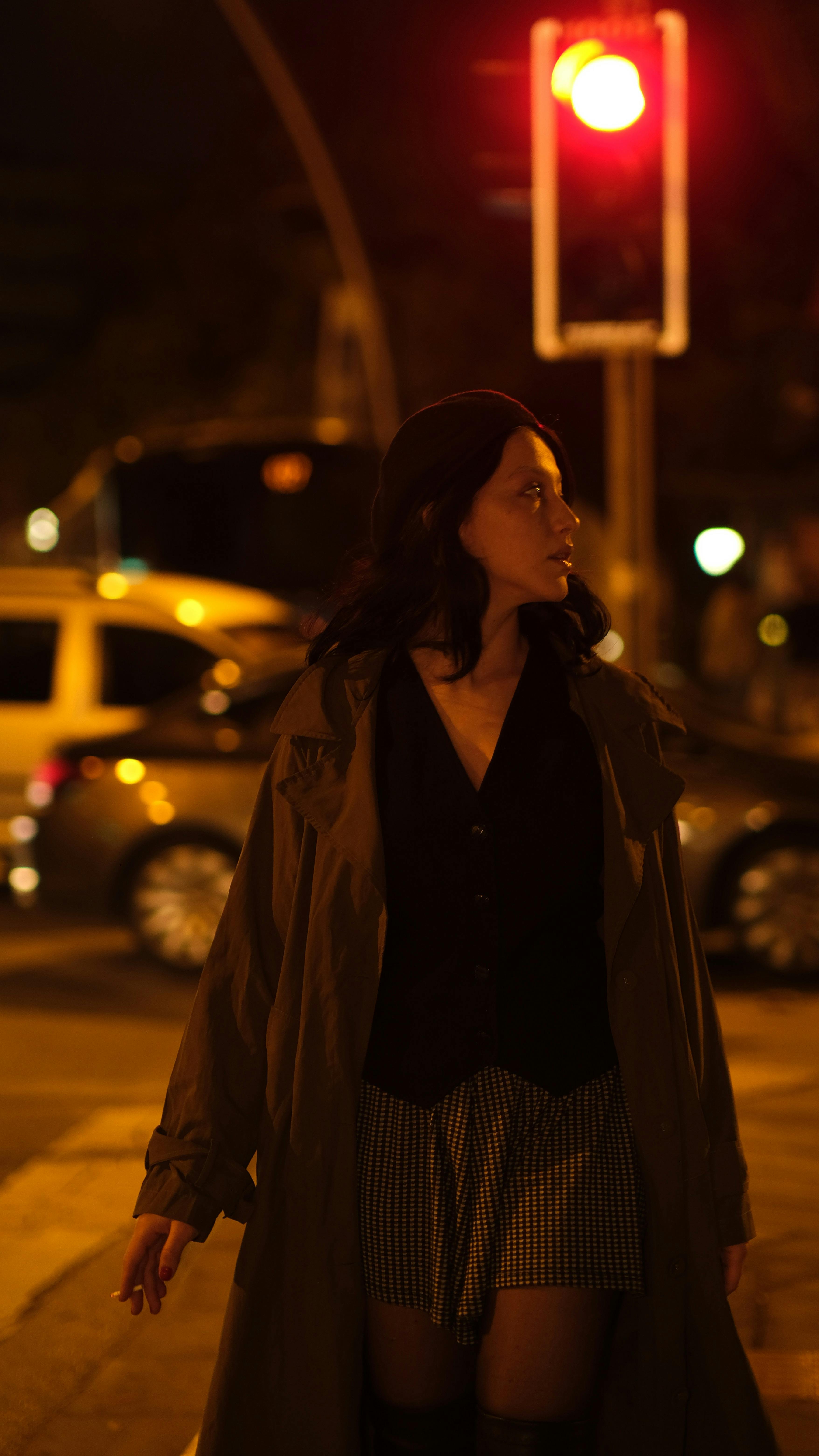 Woman Walking Sidewalk at Night · Free Stock Photo