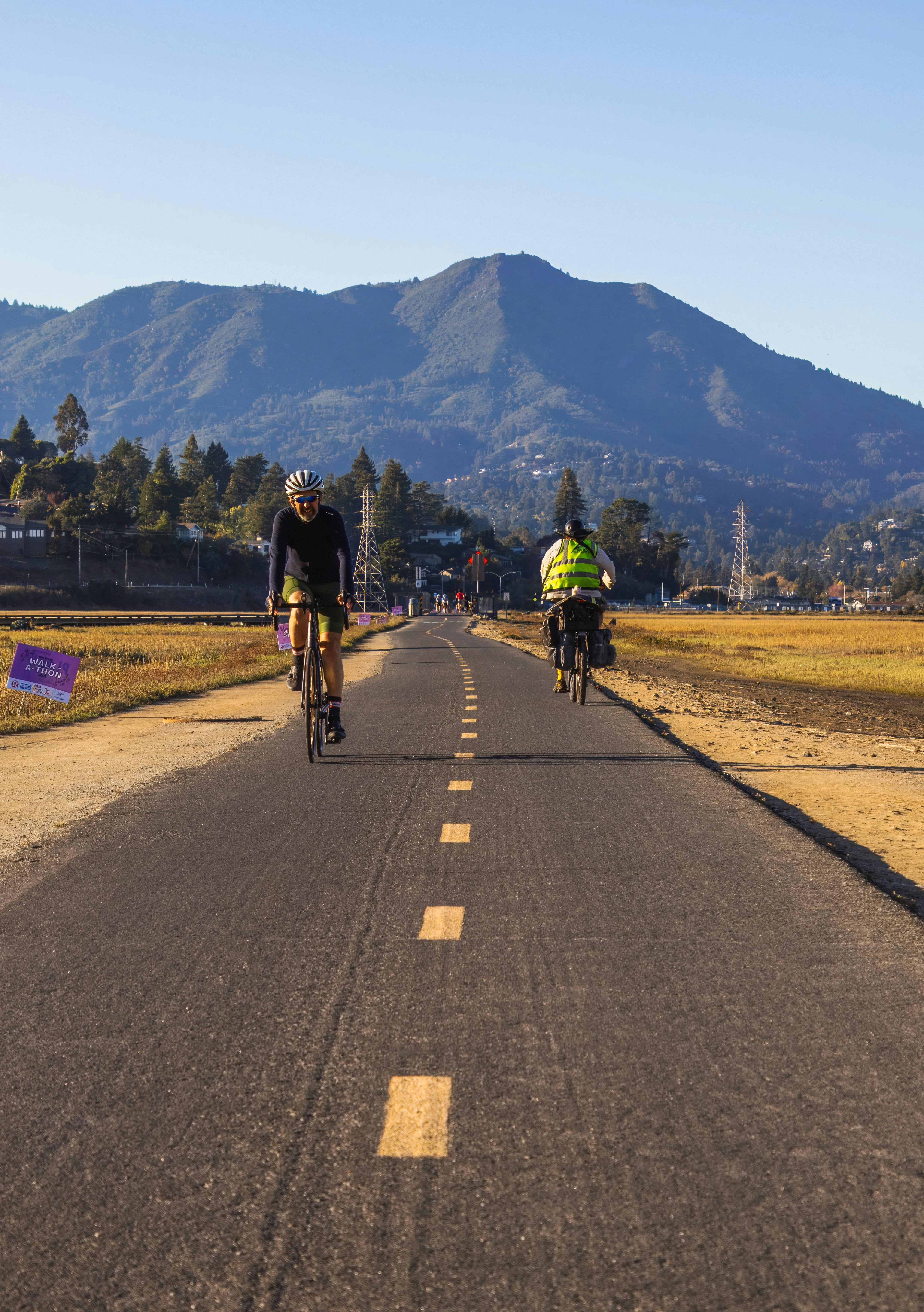 People on Bikes on Road · Free Stock Photo