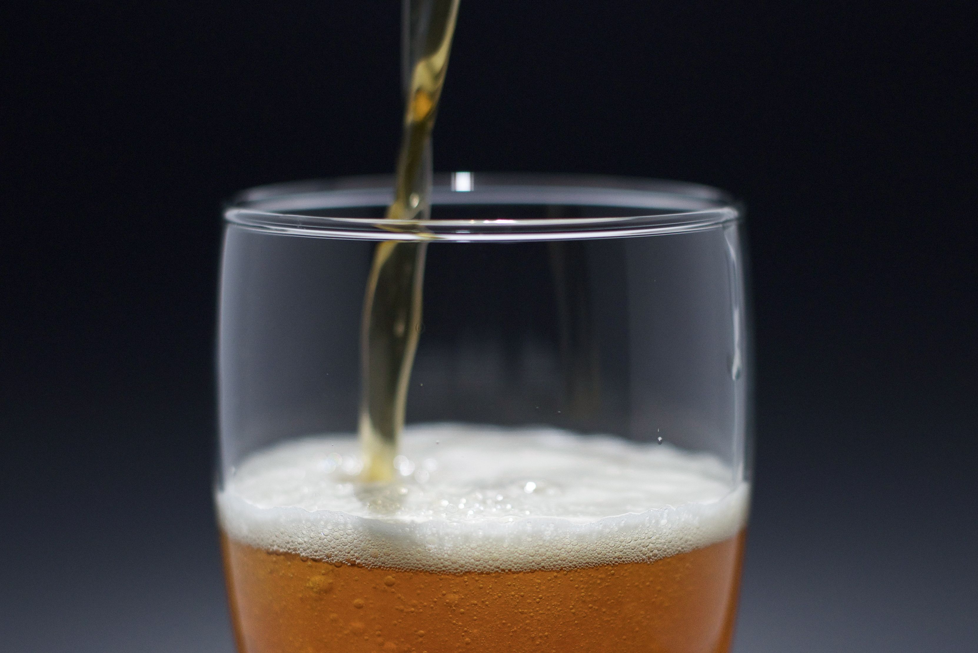Person Holding Clear Drinking Glass · Free Stock Photo